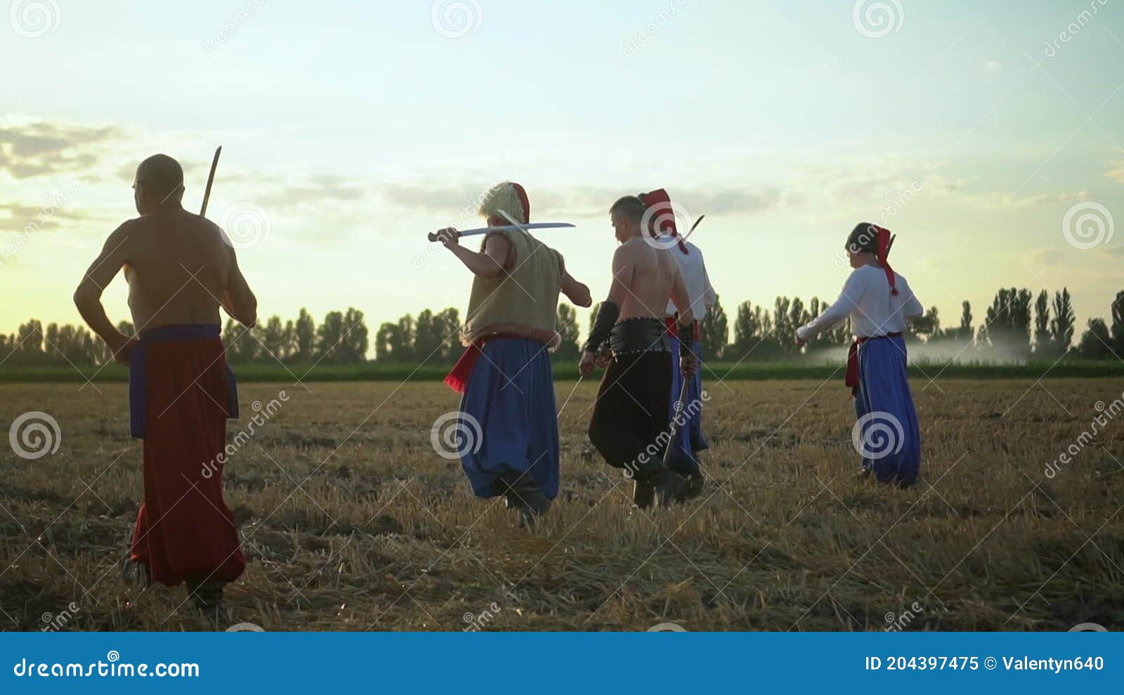 Group of Cossack Men in Traditional Clothes Swinging and Spinning Sharp ...