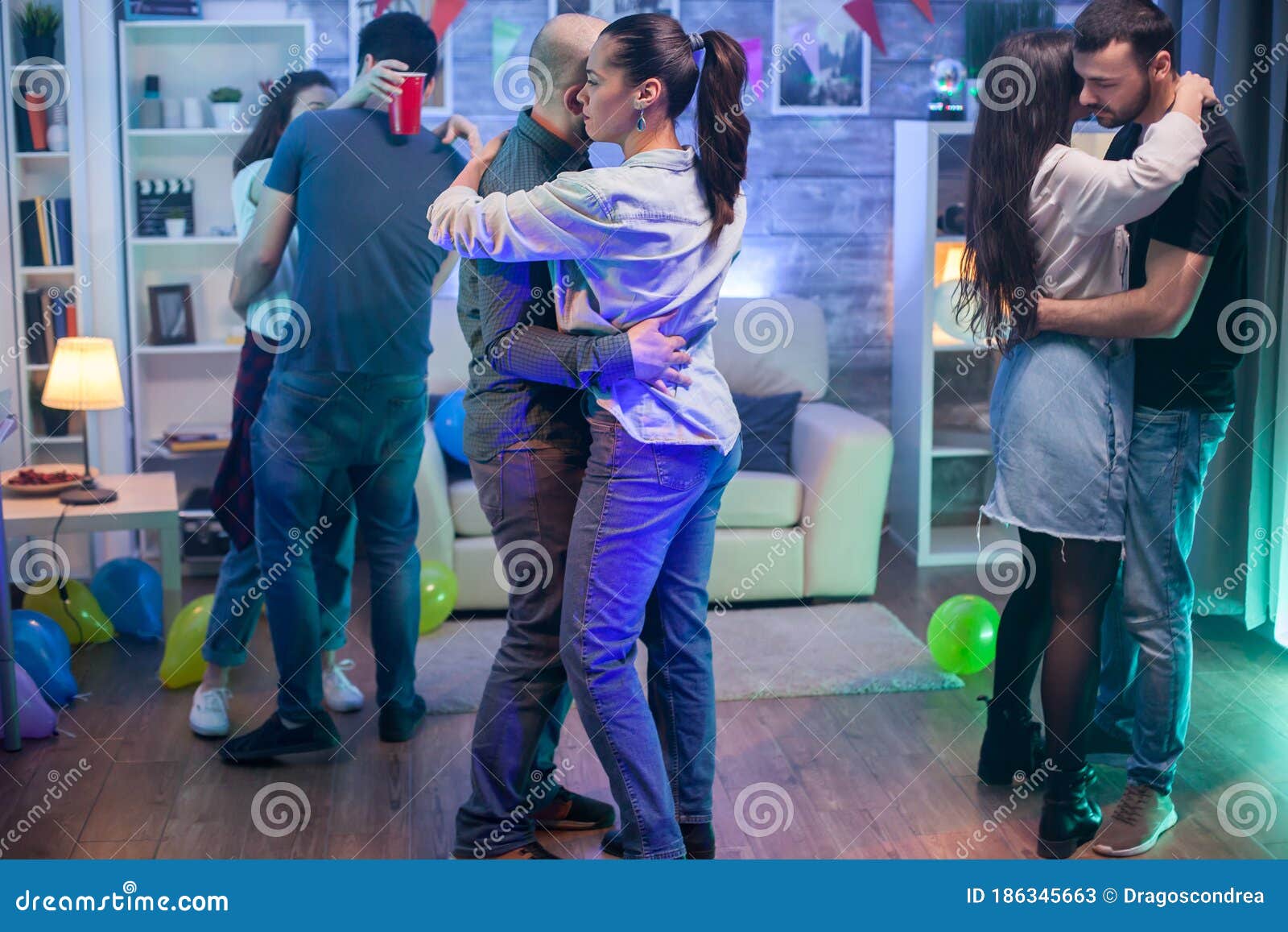 Two Funky Couples In 1980s Style Posing In The Street Royalty-Free ...