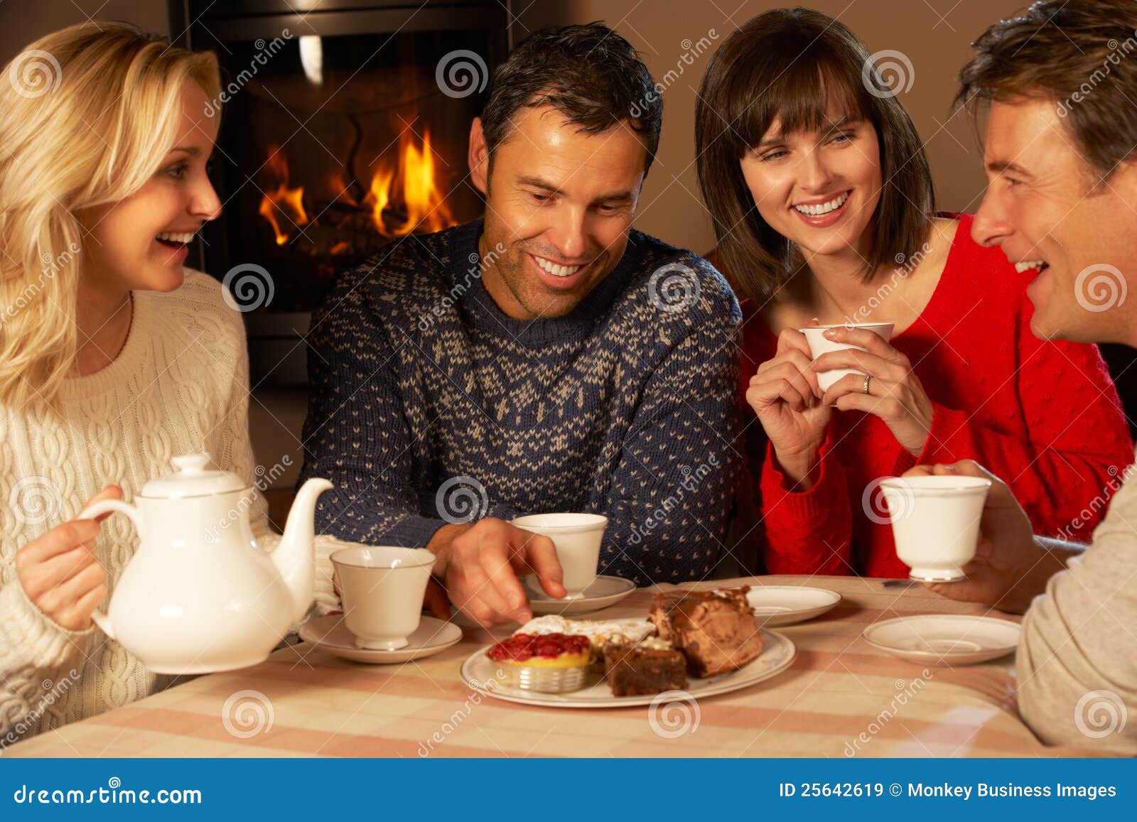 Group of Couples Enjoying Tea and Cake Together Stock Image - Image of ...