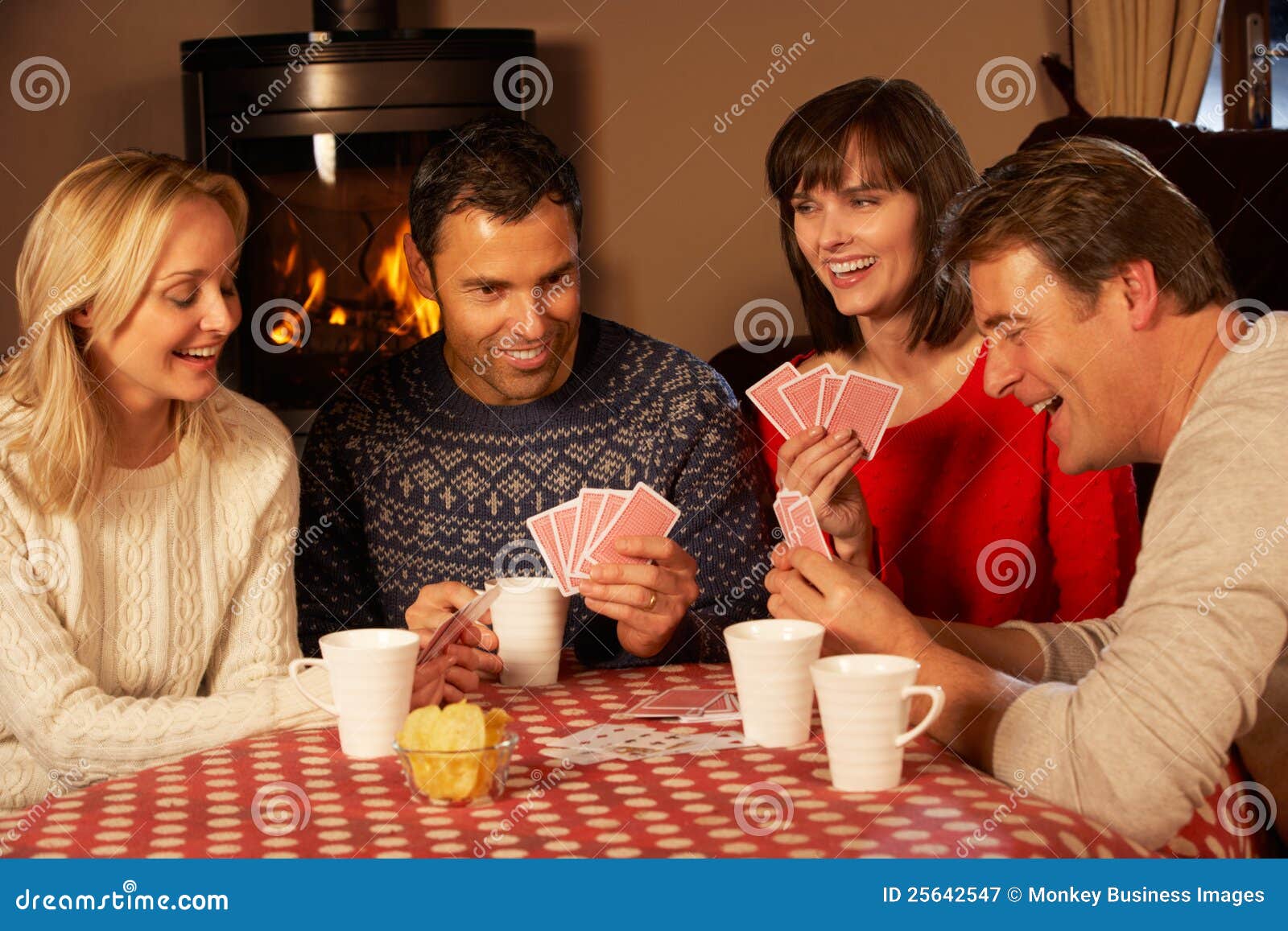 Group of Couples Playing Cards Together Stock Image - Image of jumper ...