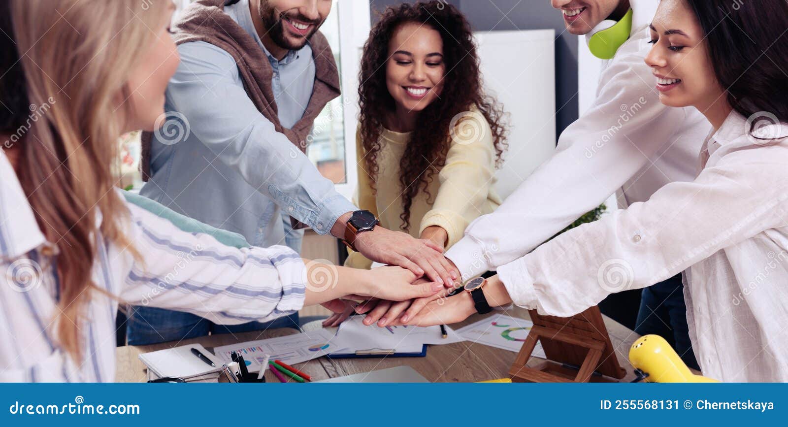 Group of Coworkers Putting Hands Together in Office. Banner Design ...