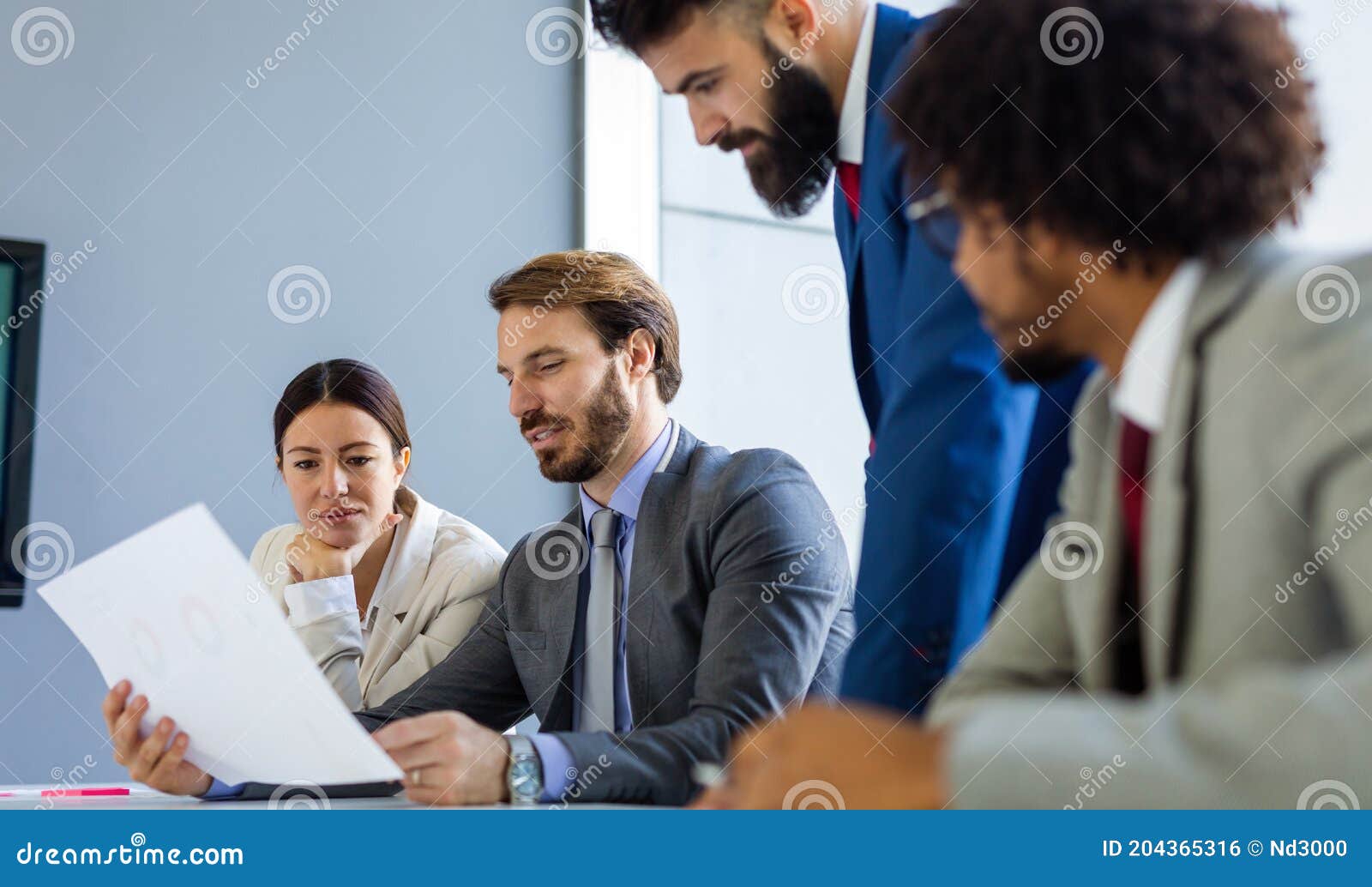 Group of Coworkers Working Together on Business Project in Modern ...