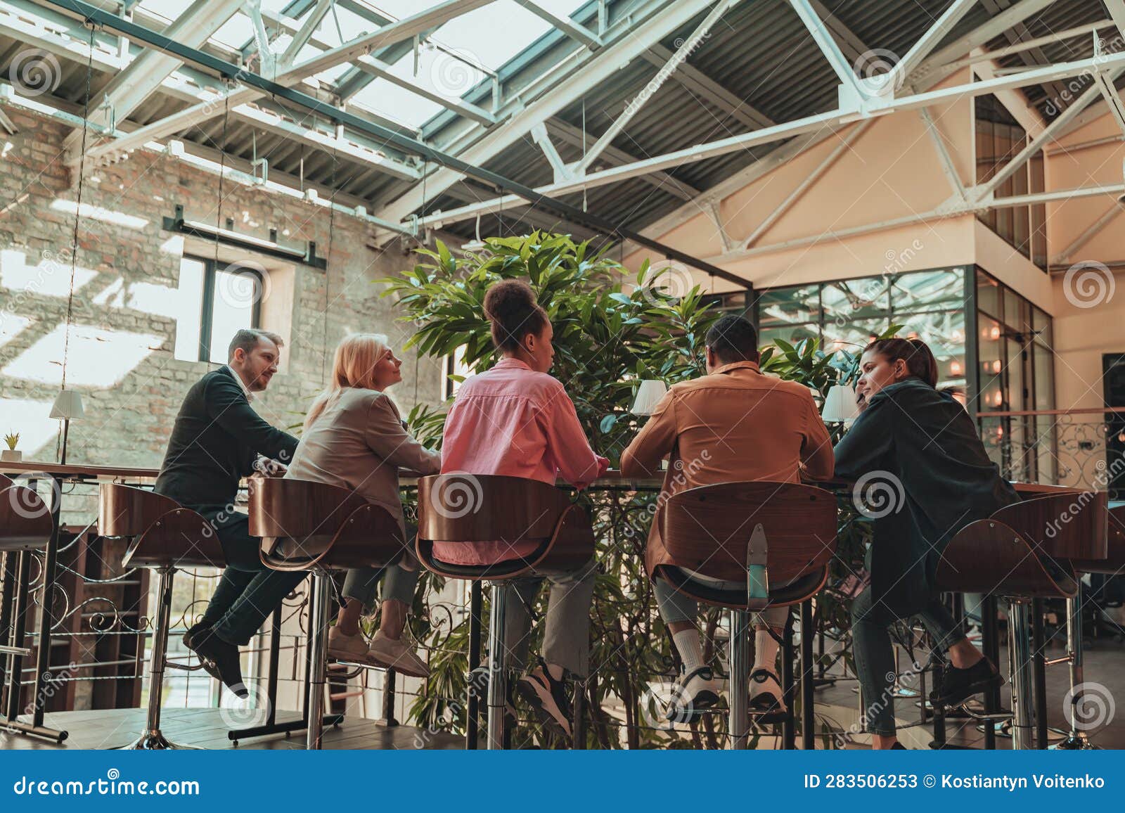 Group of Coworkers Working Together and Talking at Modern Office ...