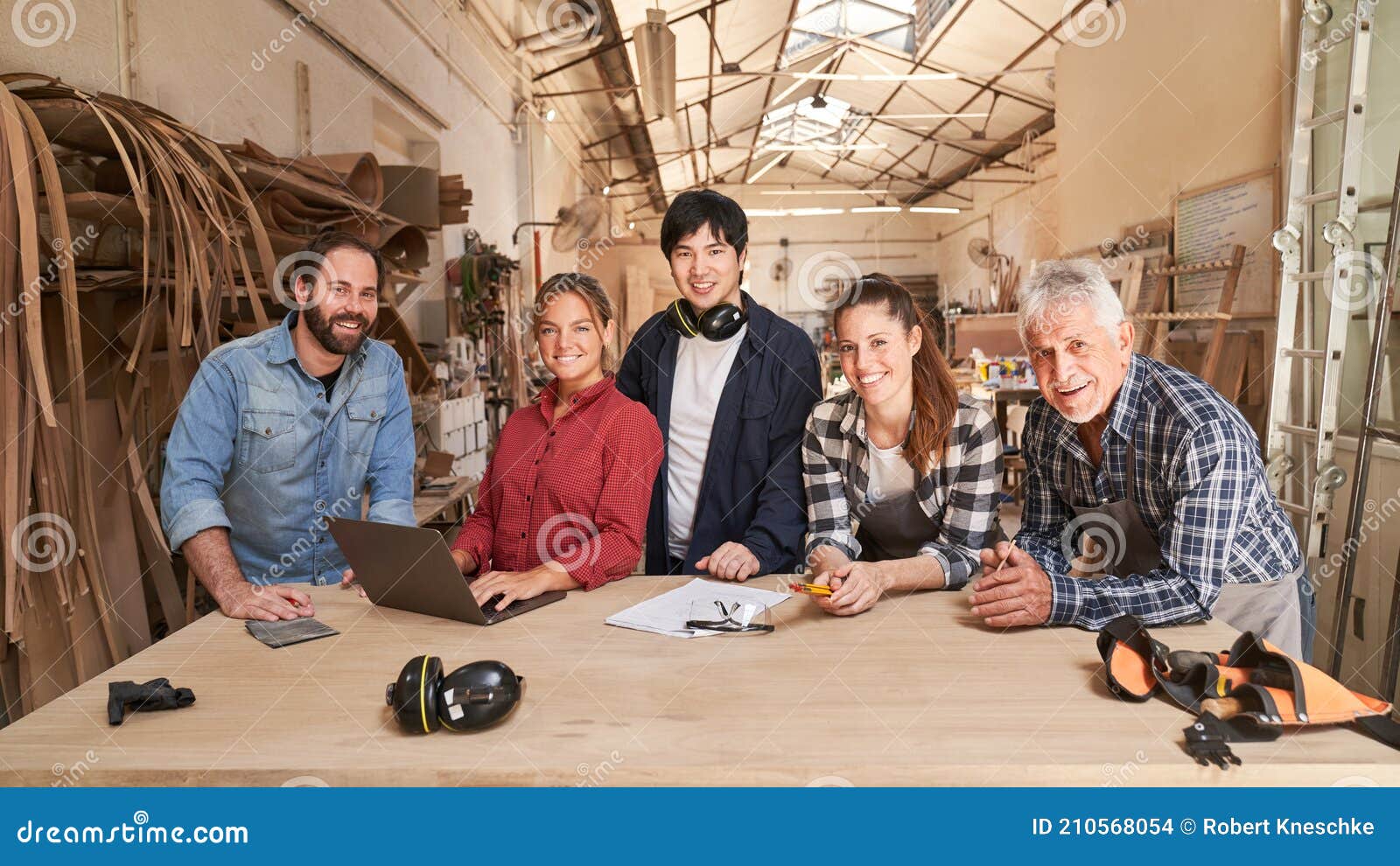 Group of Craftsmen As Carpenter Team with Computer Stock Photo - Image ...