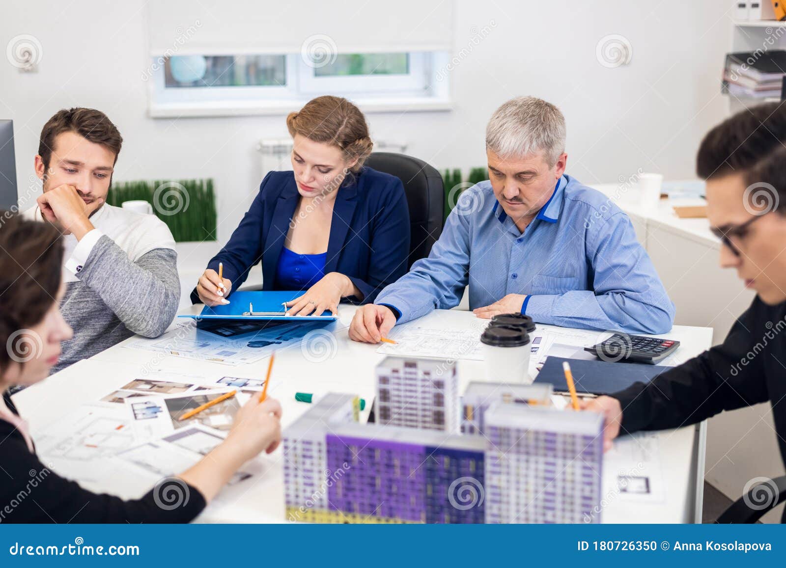 Group of Creative Designers Working with Color Samples for Selection ...