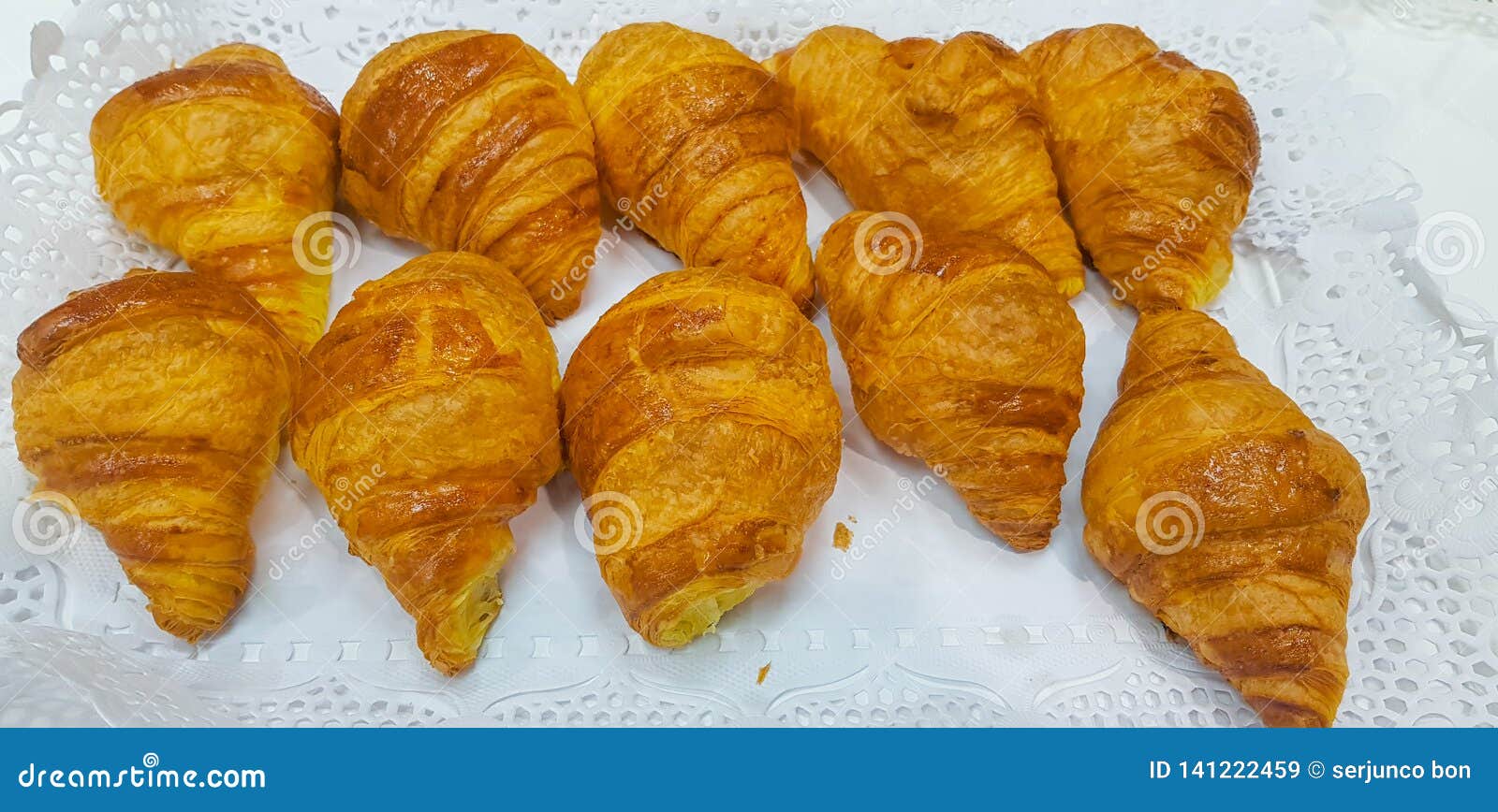 Group of Croissant Arranged in Two Rows and Ready at the Table for ...