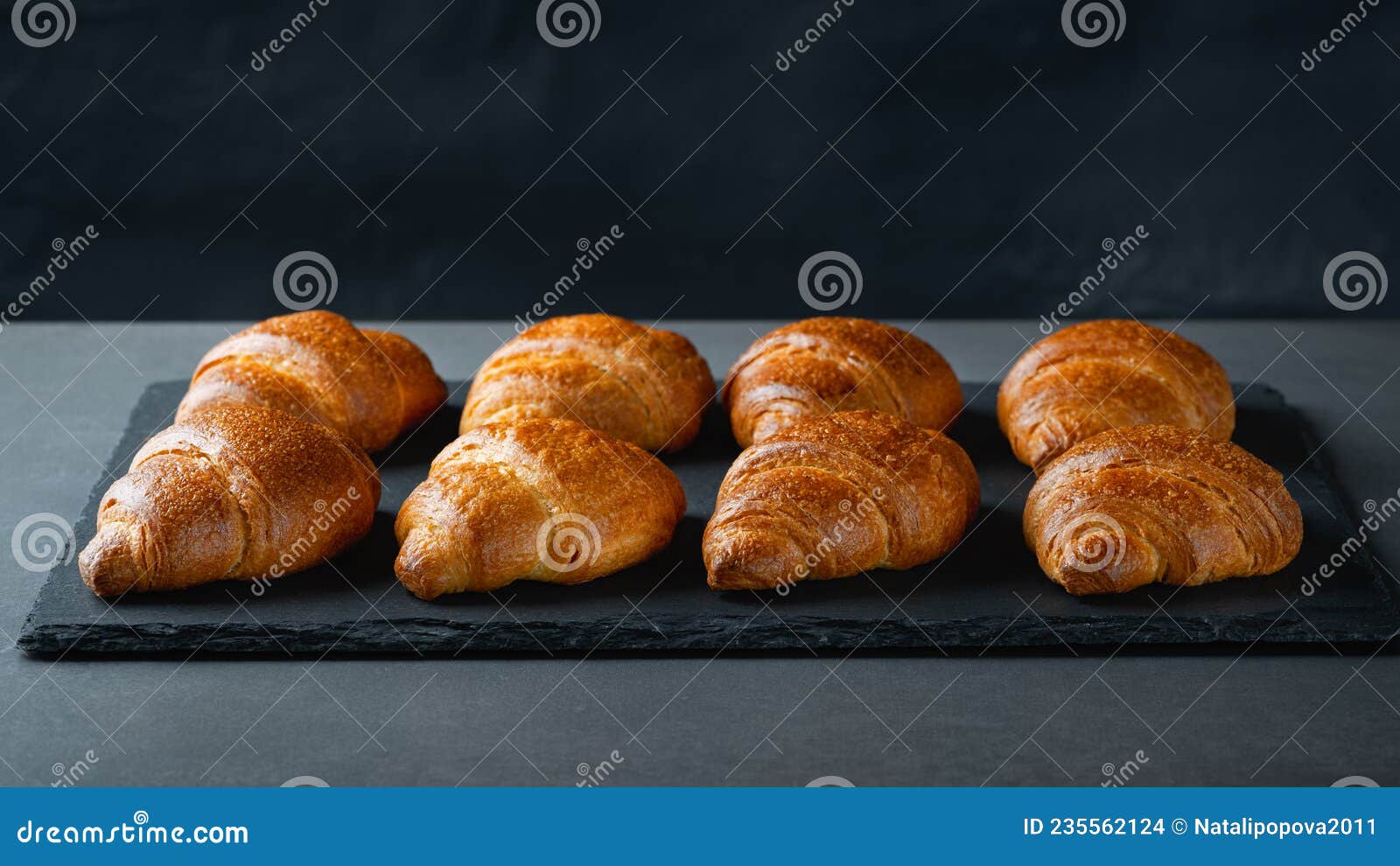 Group of Croissant Arranged in Two Rows and Ready at the Table for ...