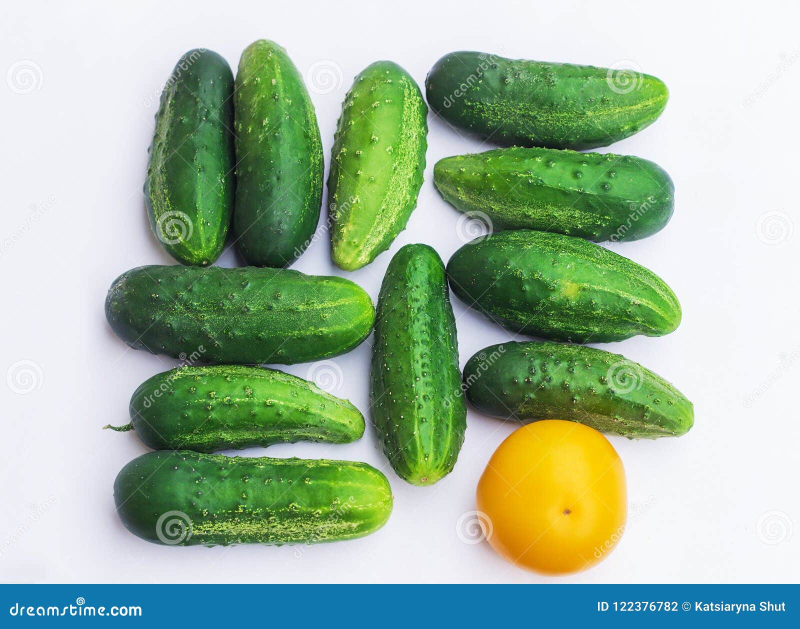 Group of Cucumbers and a Tomato with Different Colors, Different Stock ...
