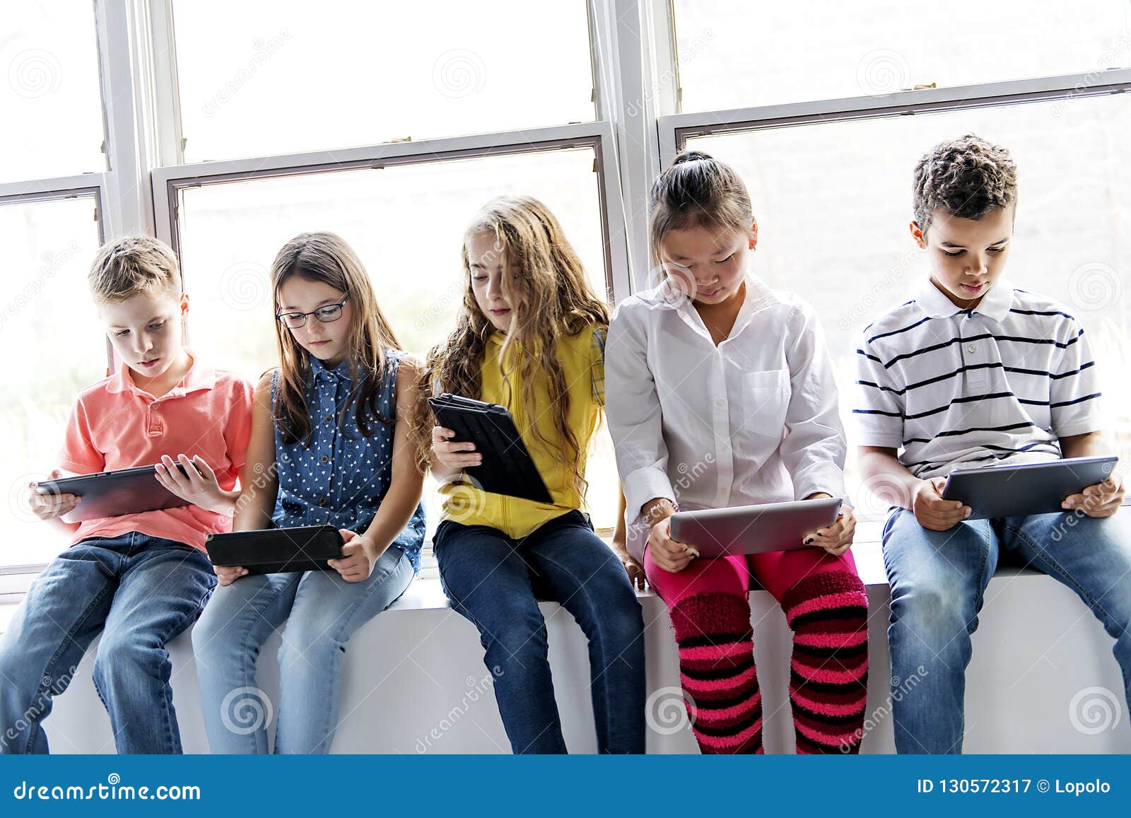 Group of Curious Children Watching Stuff on the Tablet Screen Stock ...