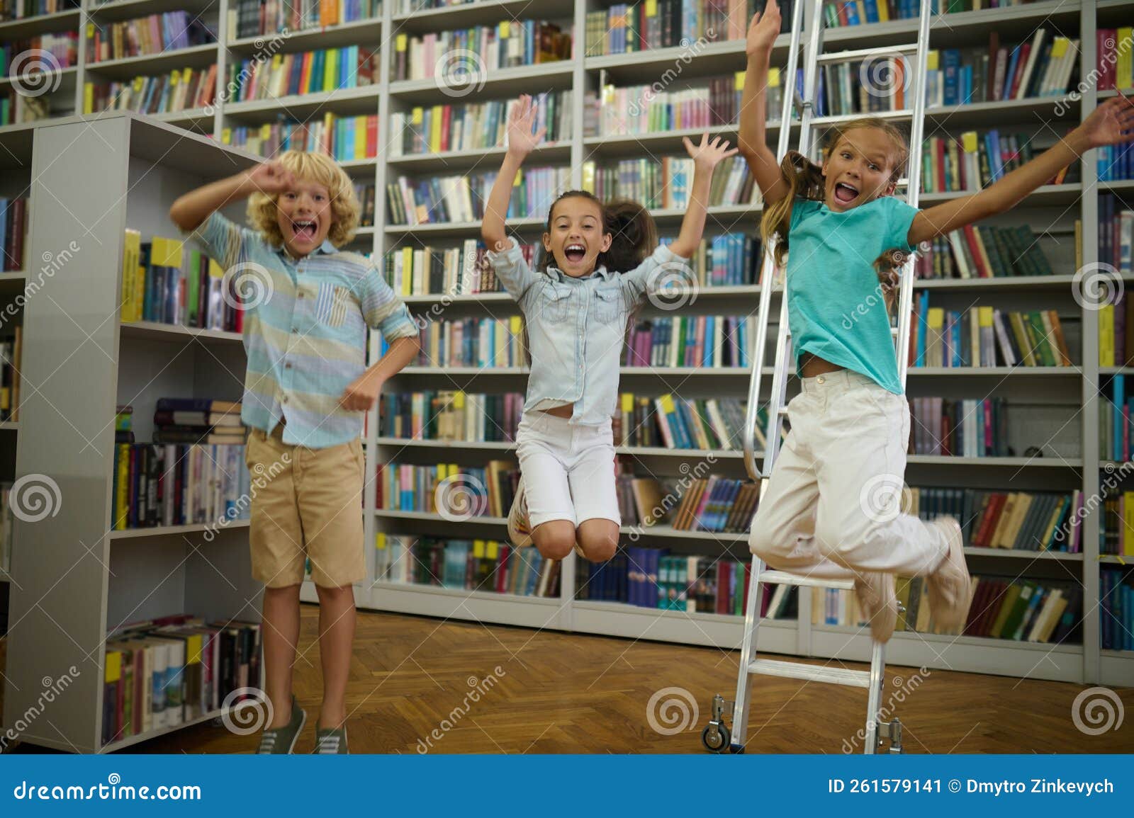 Group of Cute Kids in the Library Looking Happy and Enjoyed Stock Image ...