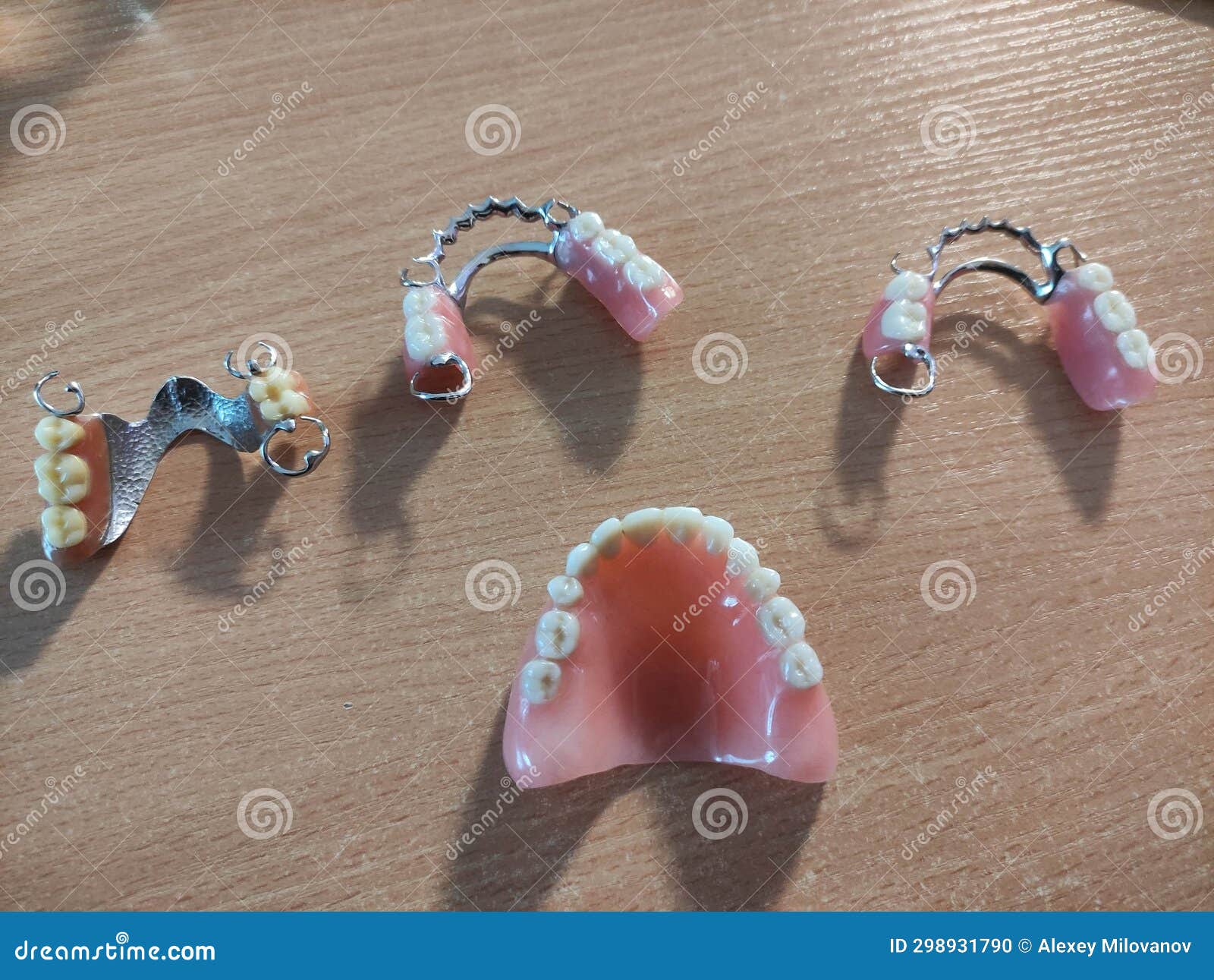 Group of Dentures on the Table at the Dentist in the Dental Office ...