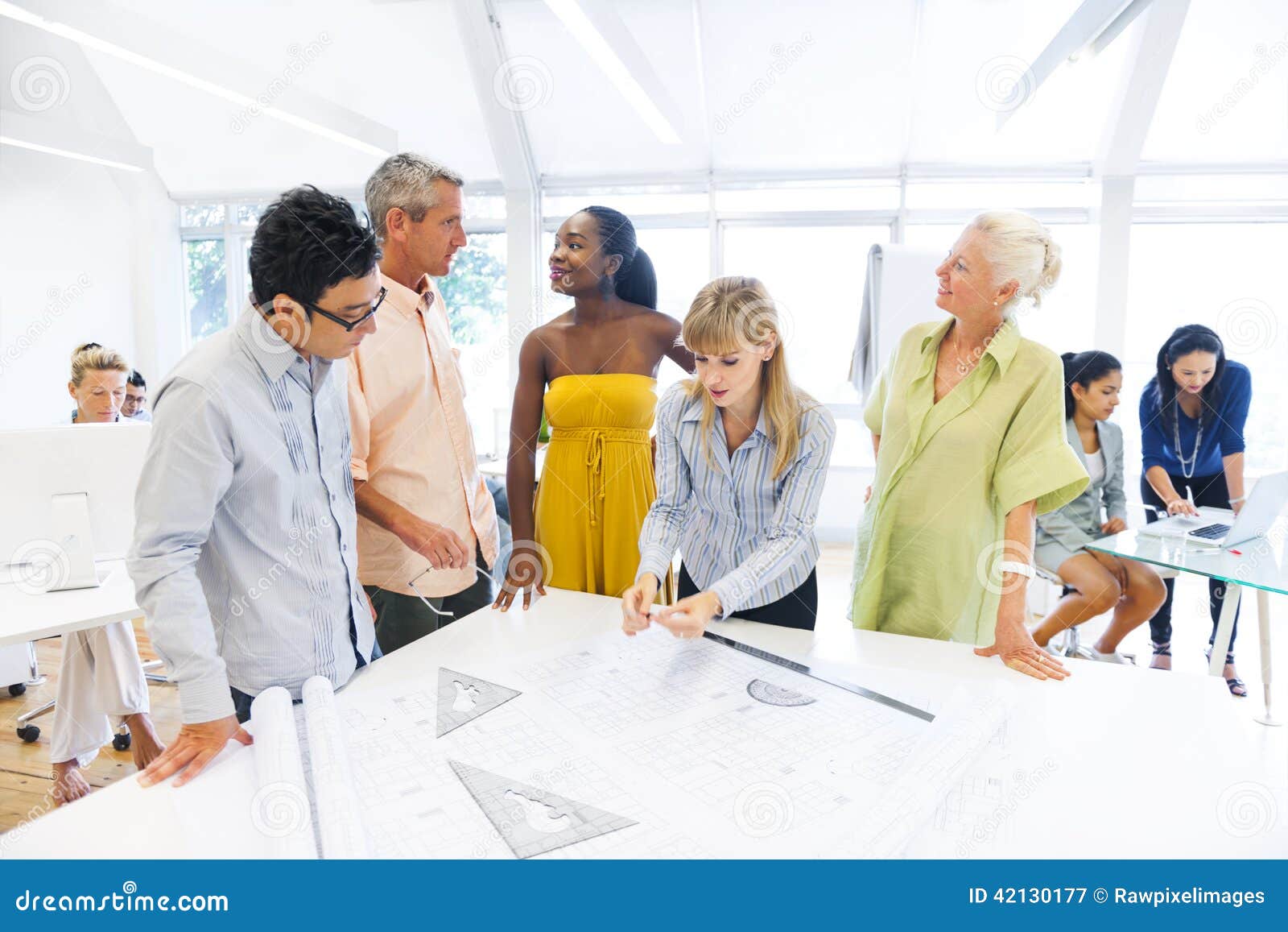 Group of Design Team in a Design Studio Working on New Project Stock ...