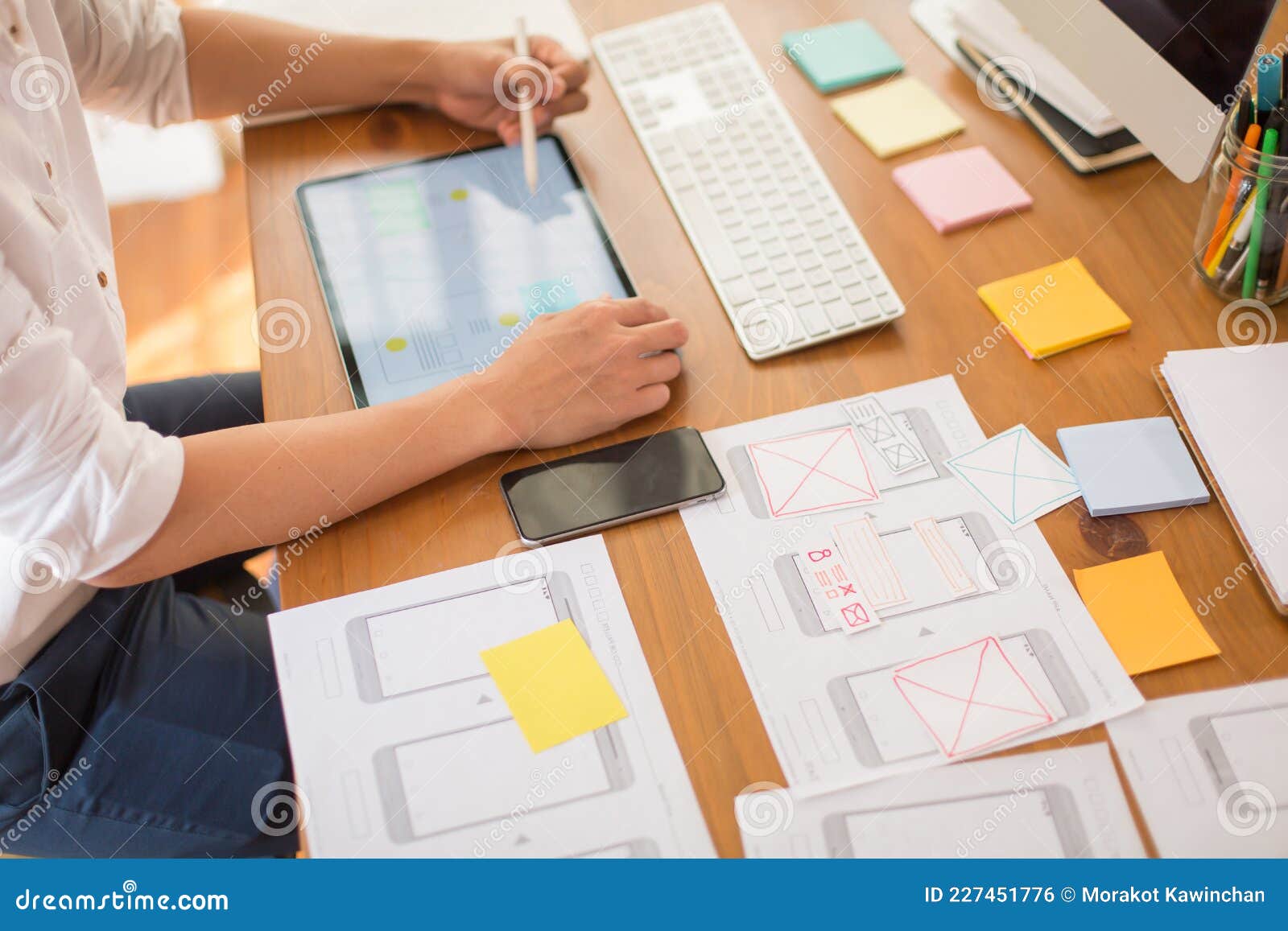 Group of Designer , or Programmer Drawing Website UX Layout App ...