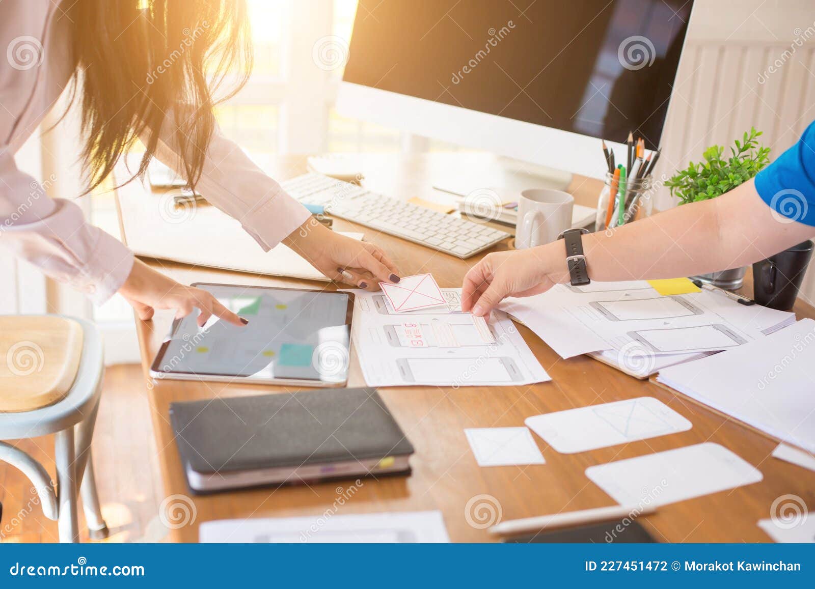 Group of Designer , or Programmer Drawing Website UX Layout App ...