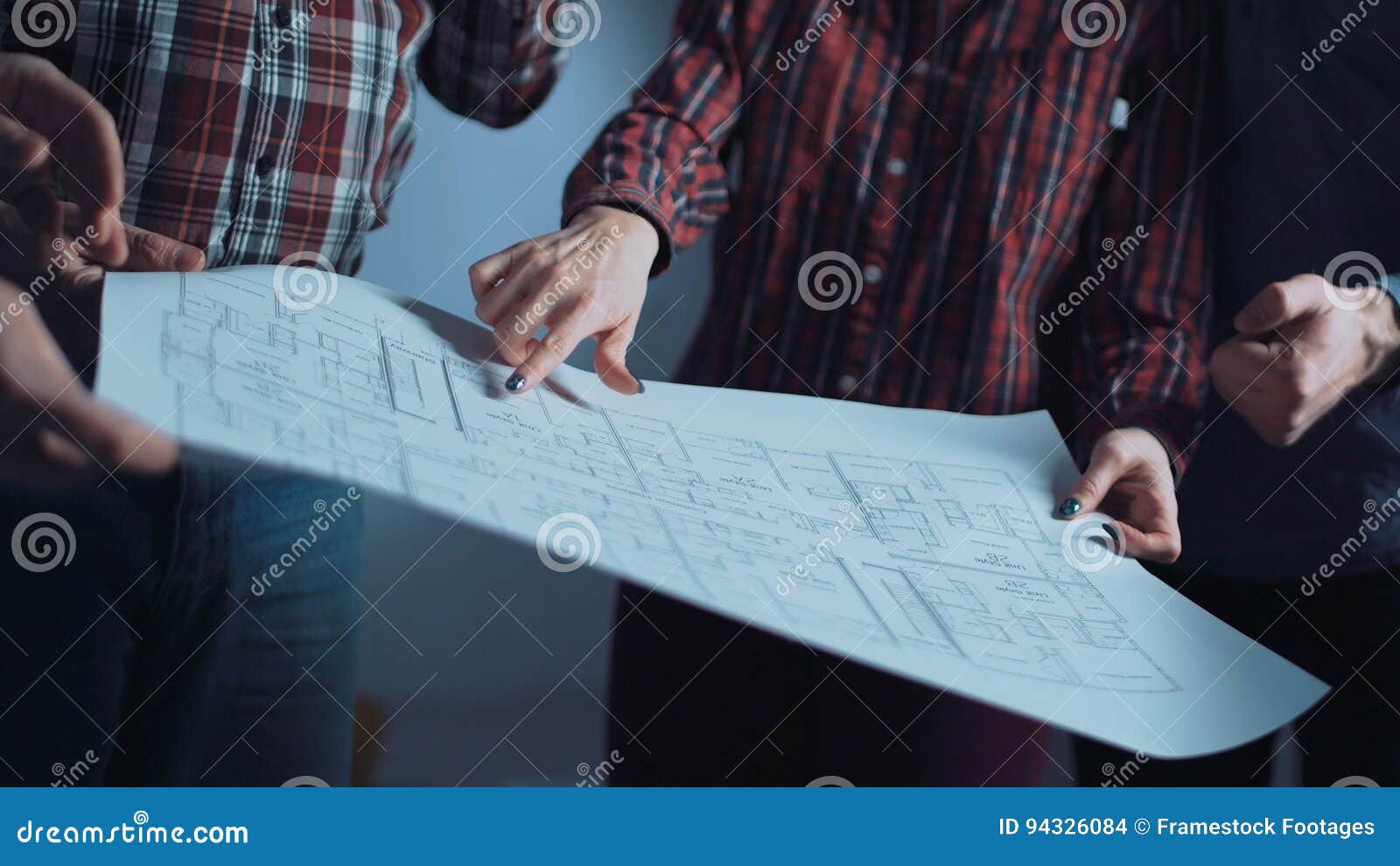 The Group of Designers Discussing Blueprints Stock Photo - Image of ...