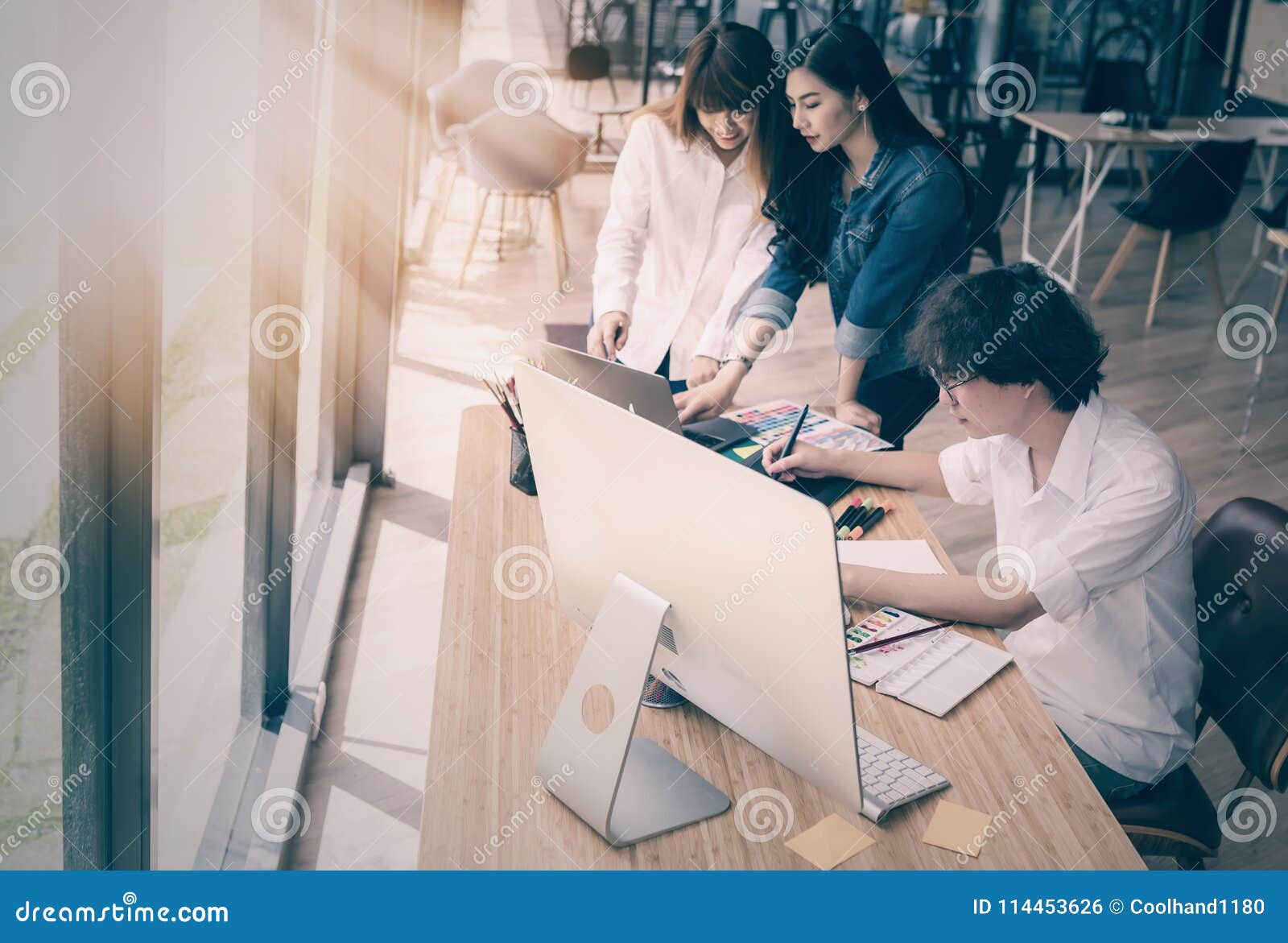 Group of Designers Smiling and Working Together Stock Photo - Image of ... Group of Designers Smiling and Working Together Stock Photo - Image of ...