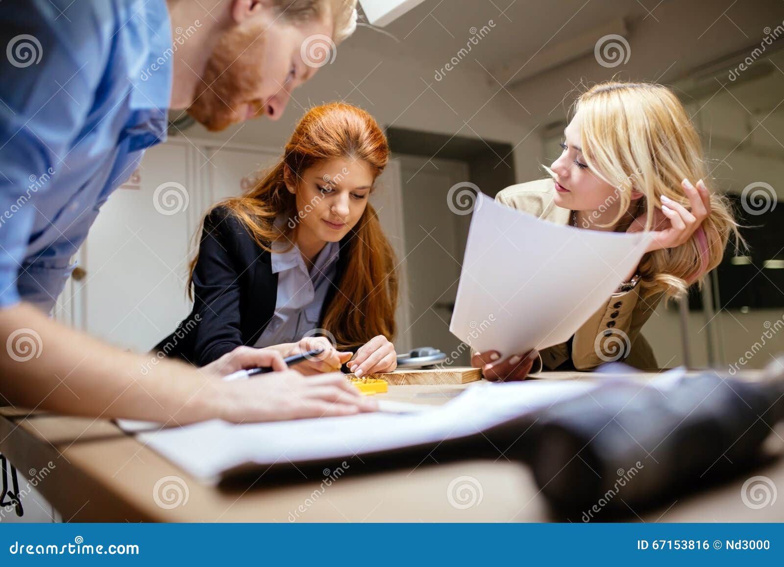 Group of Designers Working on a Project Stock Photo - Image of ...