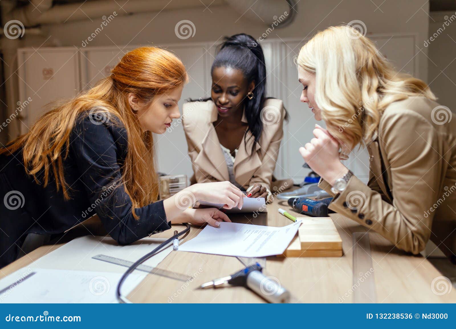 Group of Designers Working on a Project Stock Photo - Image of male ... Group of Designers Working on a Project Stock Photo - Image of male ...