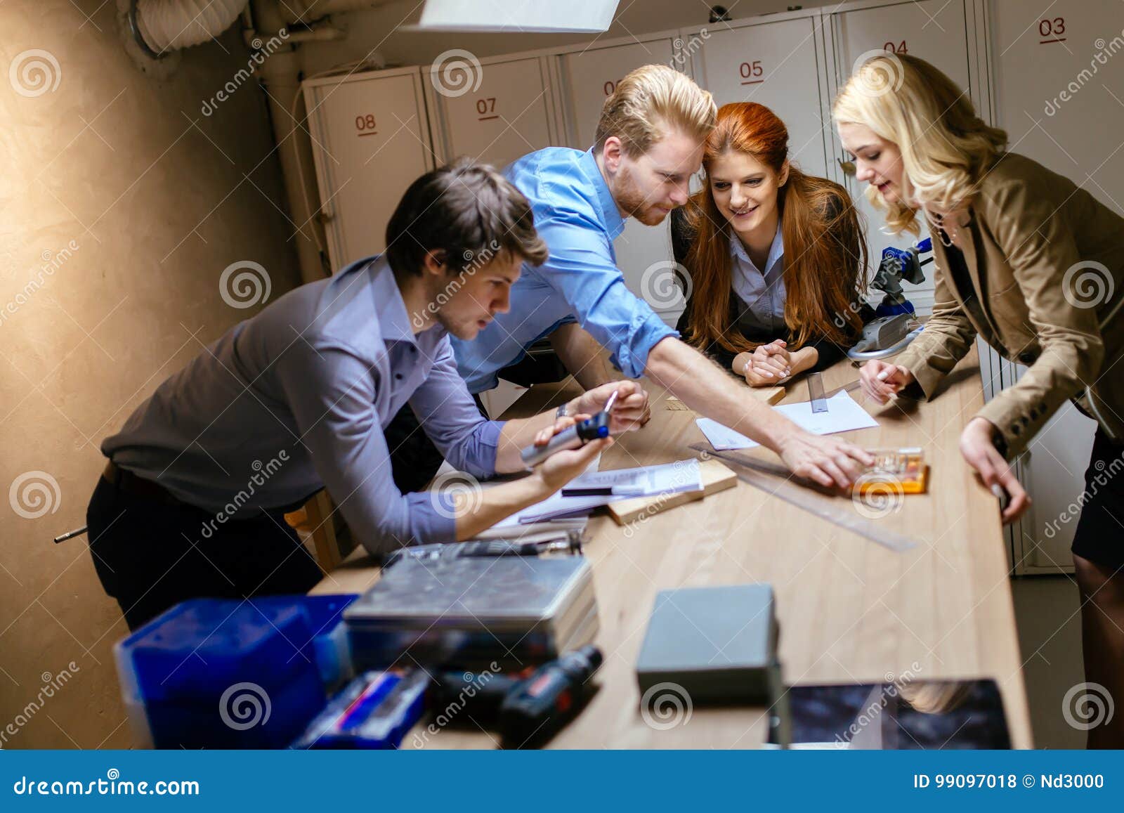 Group of Designers Working on a Project Stock Photo - Image of creative ... Group of Designers Working on a Project Stock Photo - Image of creative ...