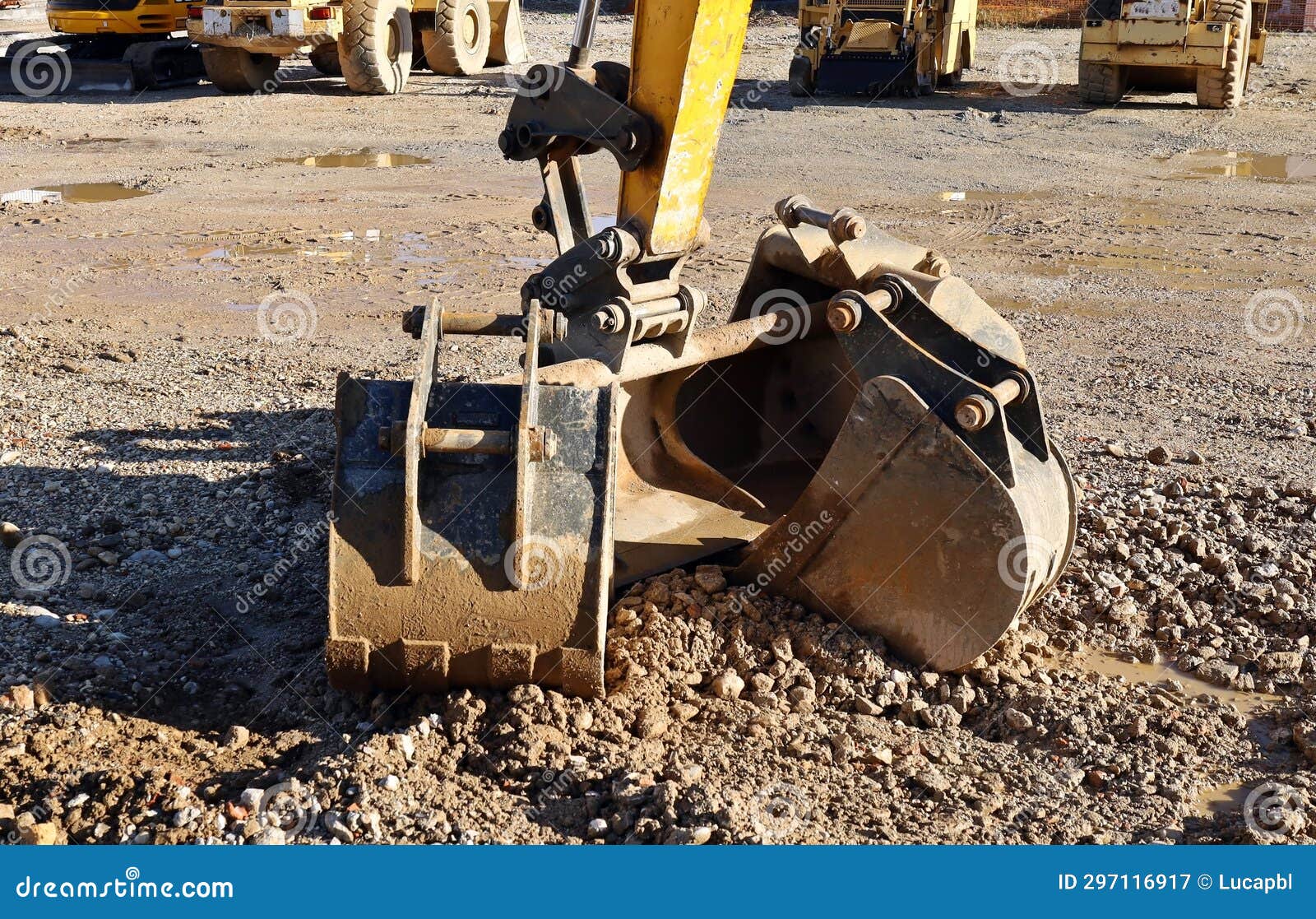 Group of Different Bucket Types Under the Excavator Boom on the Ground ...