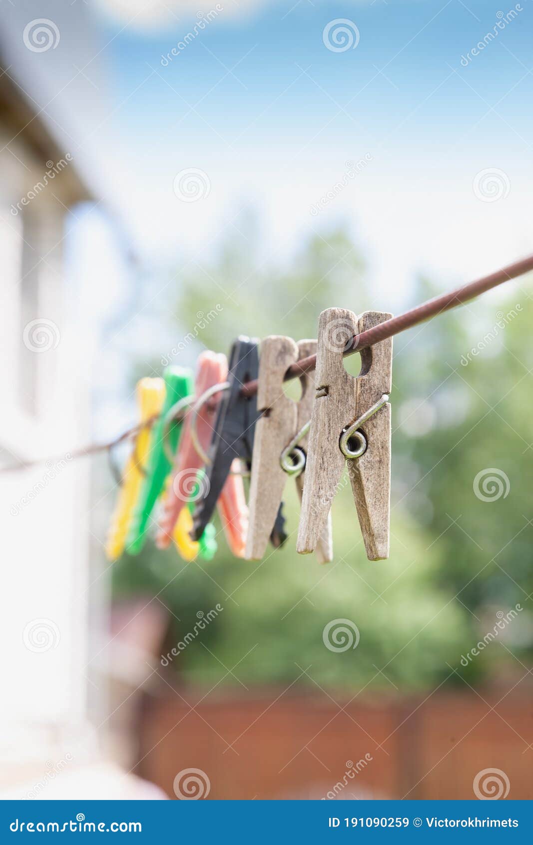 Group of Different Clothespin for Clothes are on Clothesline Rope ...