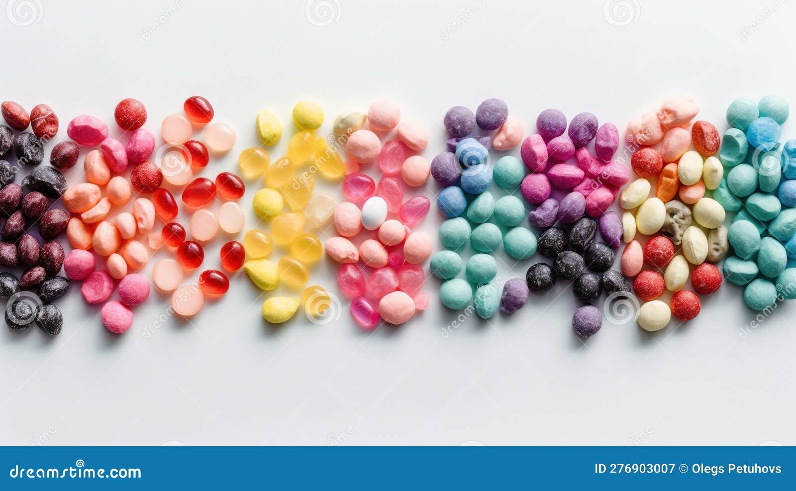A Group of Different Colored Candies on a White Surface Stock ...