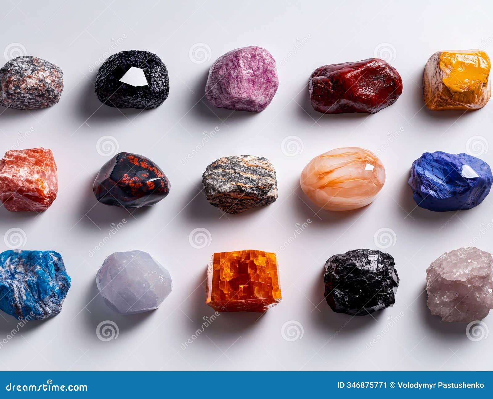 A Group of Different Colored Rocks on a White Surface Stock Image ...