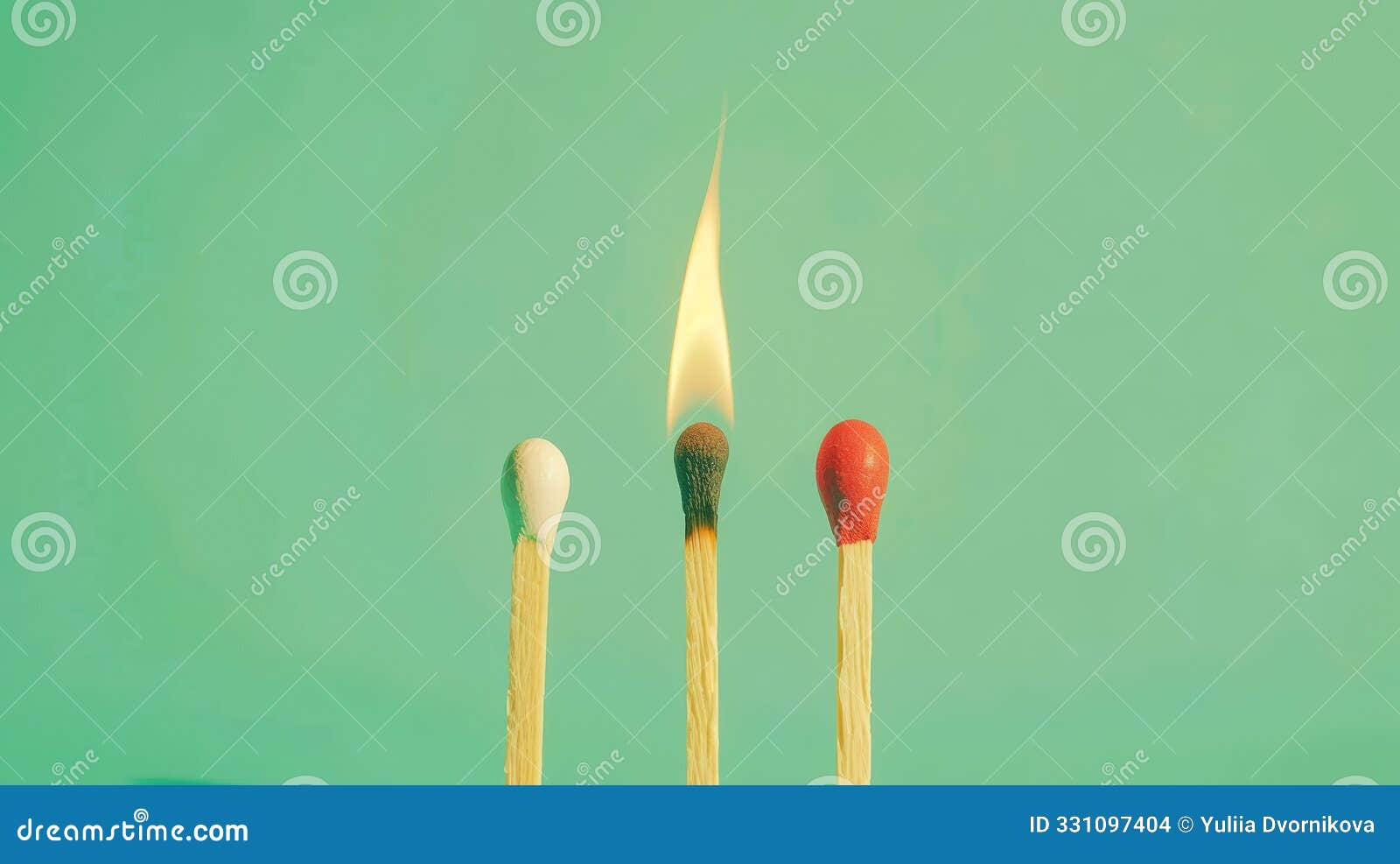 Group of Different Matches, Some Burning, Pastel Blue Background ...