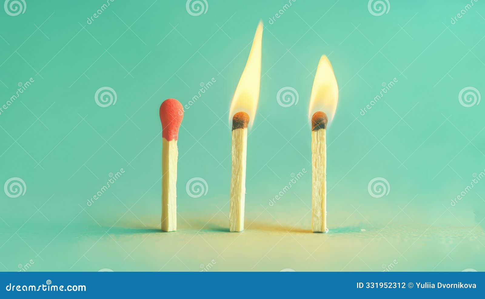 Group of Different Matches, Some Burning, Pastel Blue Background ...
