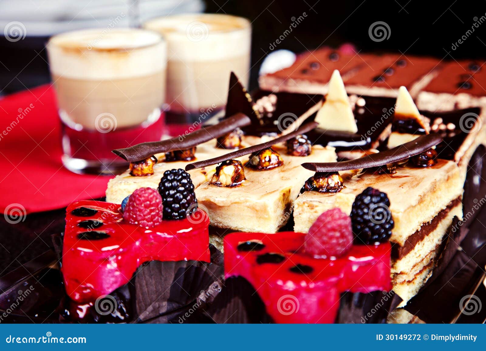 Group of Different Mini Cakes Stock Photo - Image of dark, tart: 30149272