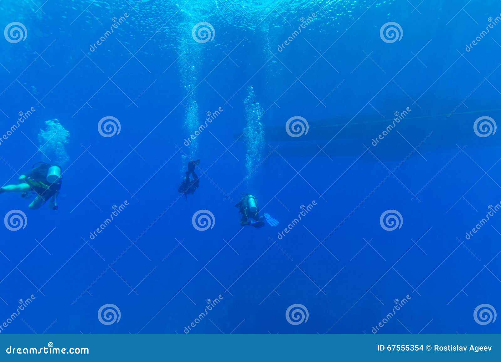 Group of Divers Near Boat Underwater Stock Photo - Image of surface ...