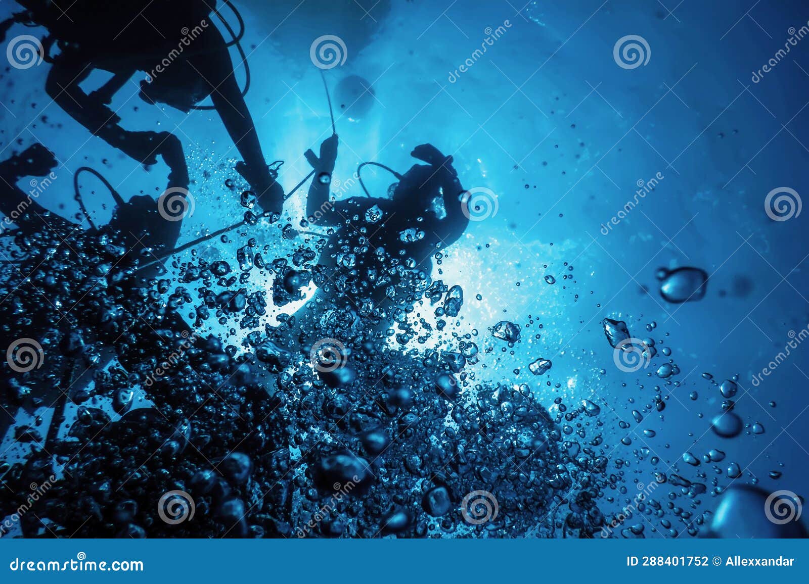 Group of Divers on Safety Stop Underwater Bubbles Stock Photo - Image ...
