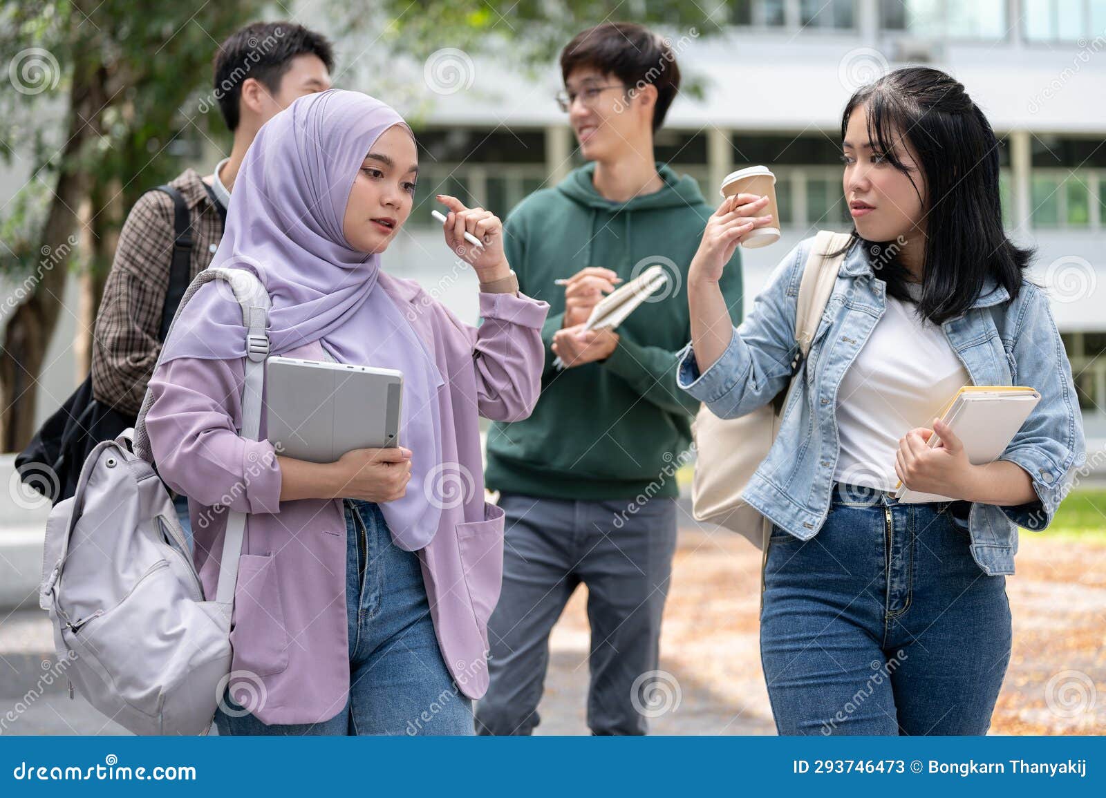 A Group of Diverse Asian University Students are Talking while Walking ...