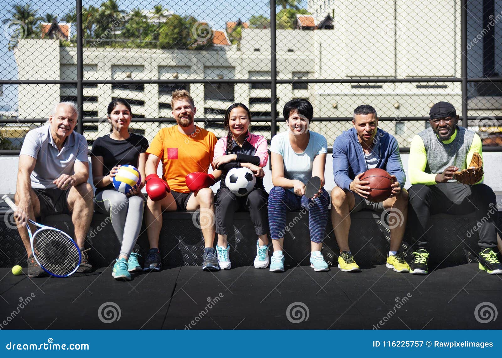Group of Diverse Athletes Sitting Together Stock Image - Image of ...