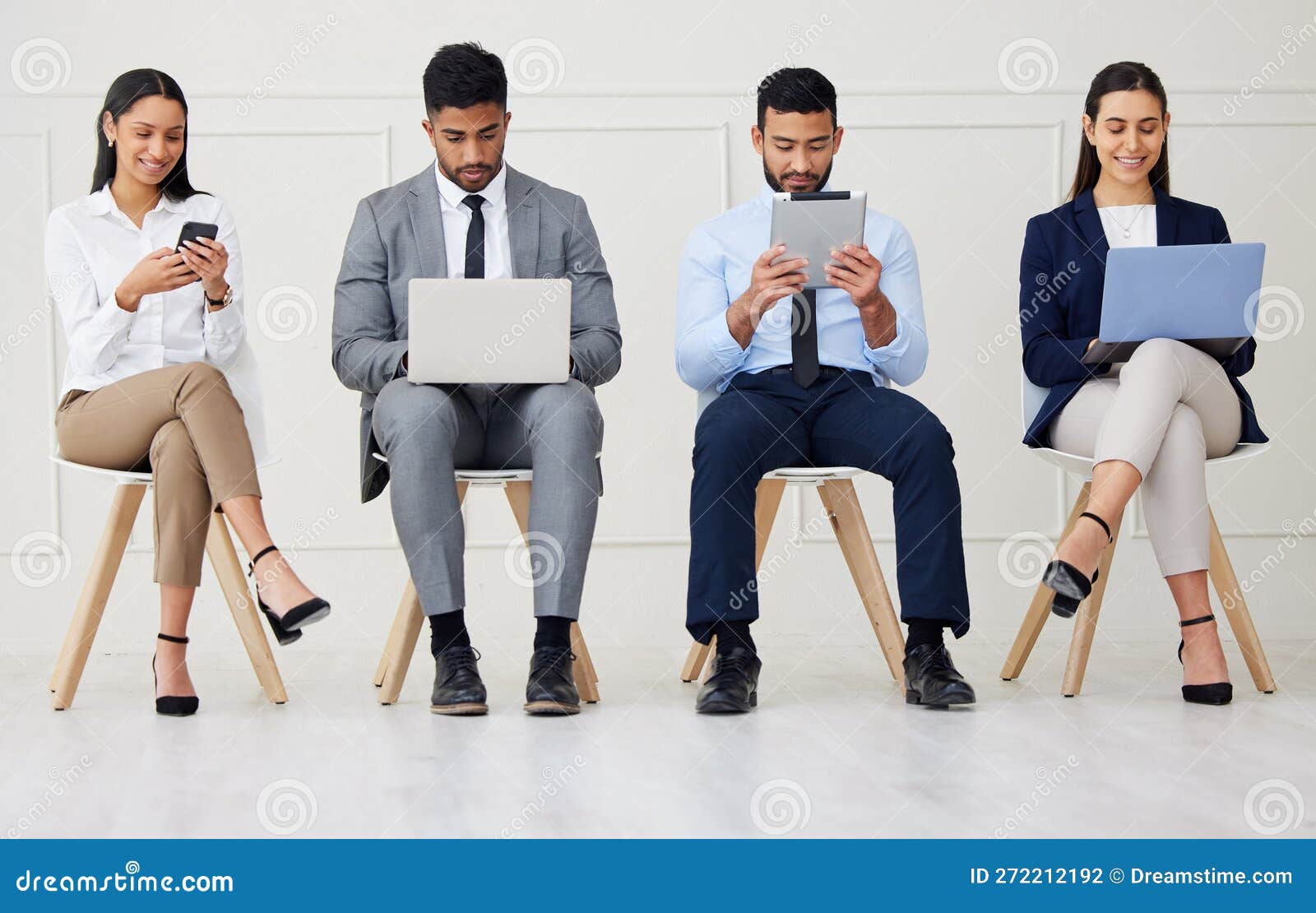 Group of Diverse Businesspeople Waiting for Interview and Using ...