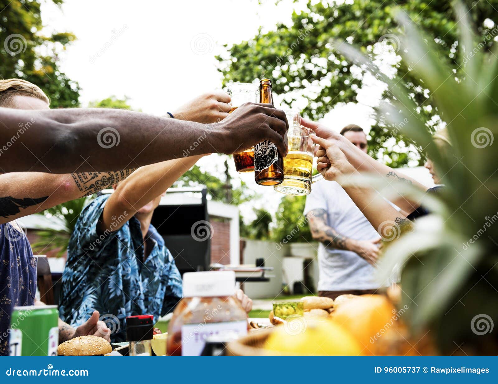 Group of Diverse Friends Celebrating Drinking Beers Together Summer ...