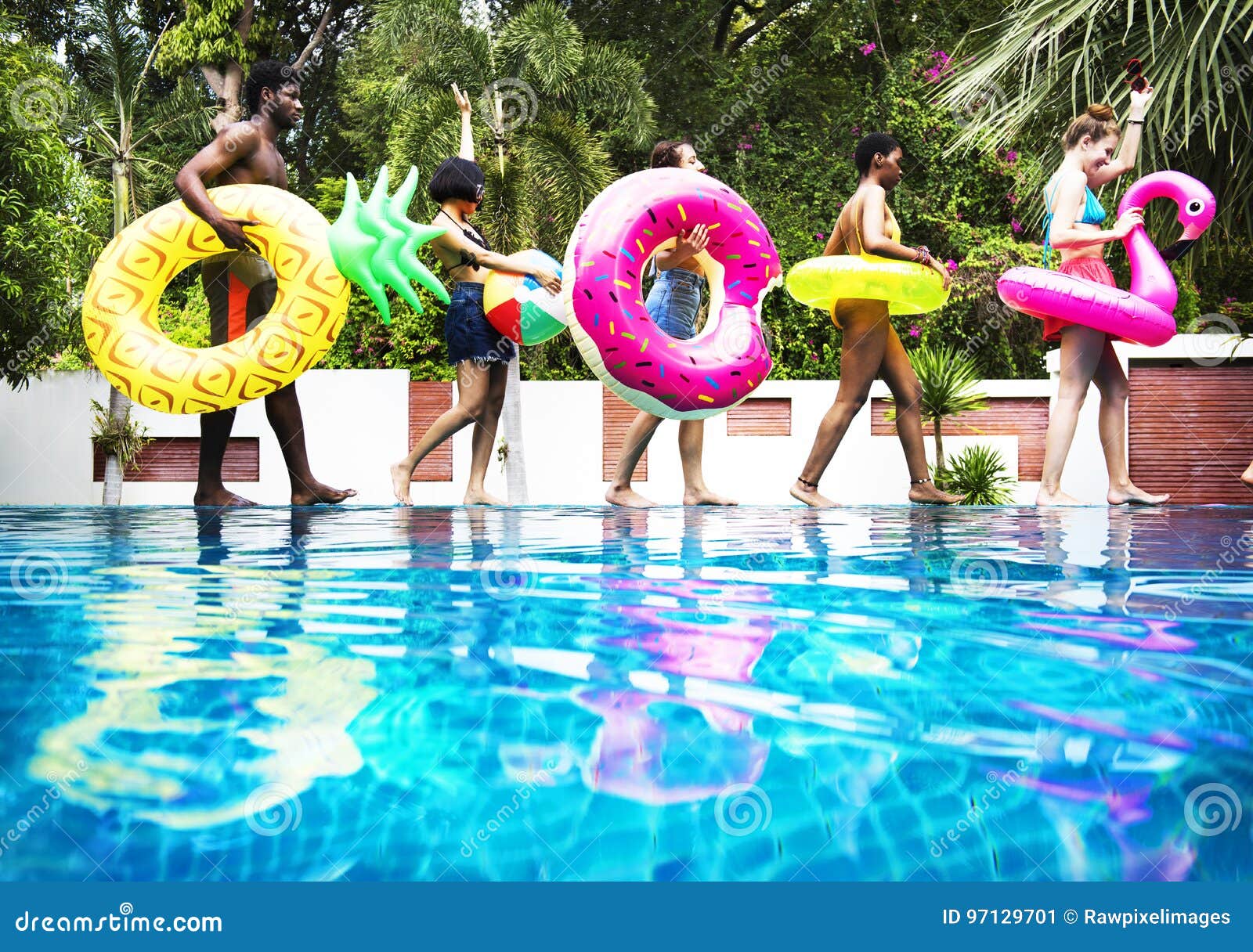 Group of Diverse Friends Enjoying Summer Time by the Pool with I Stock ...