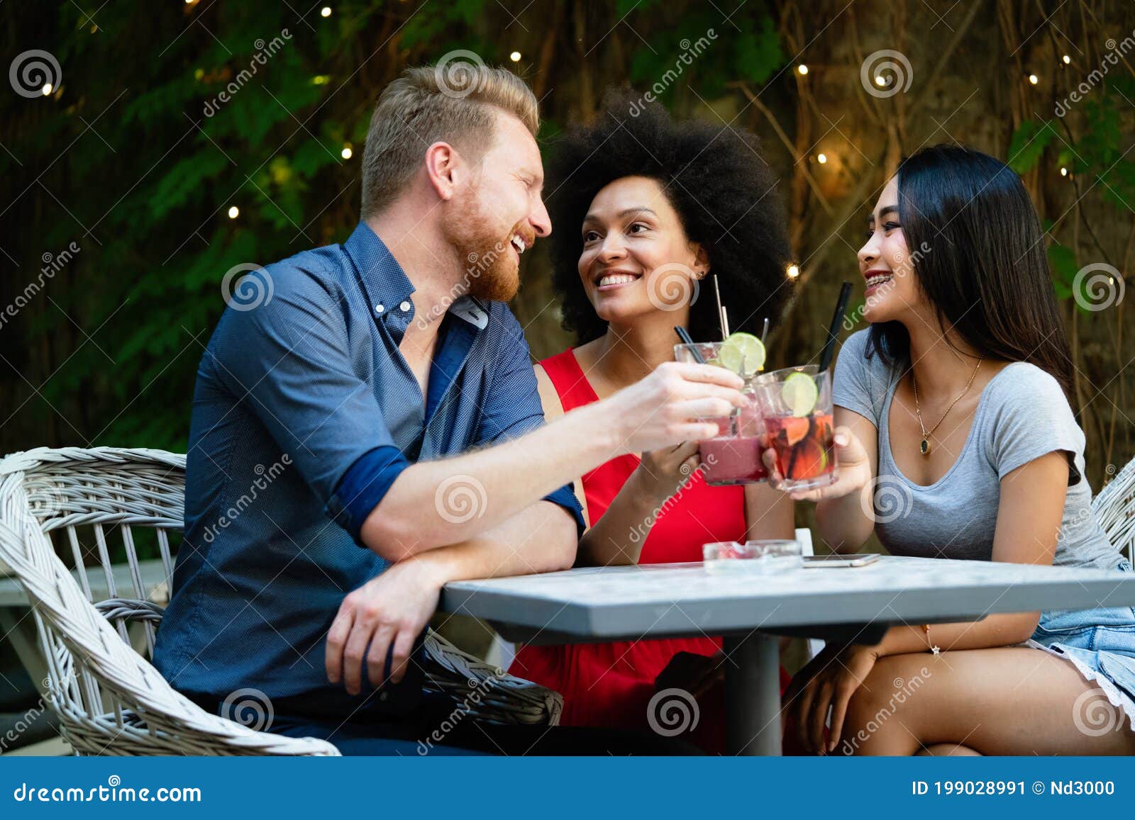 Group of Diverse Friends Talking and Having Fun at Cafe Outdoor Stock ...