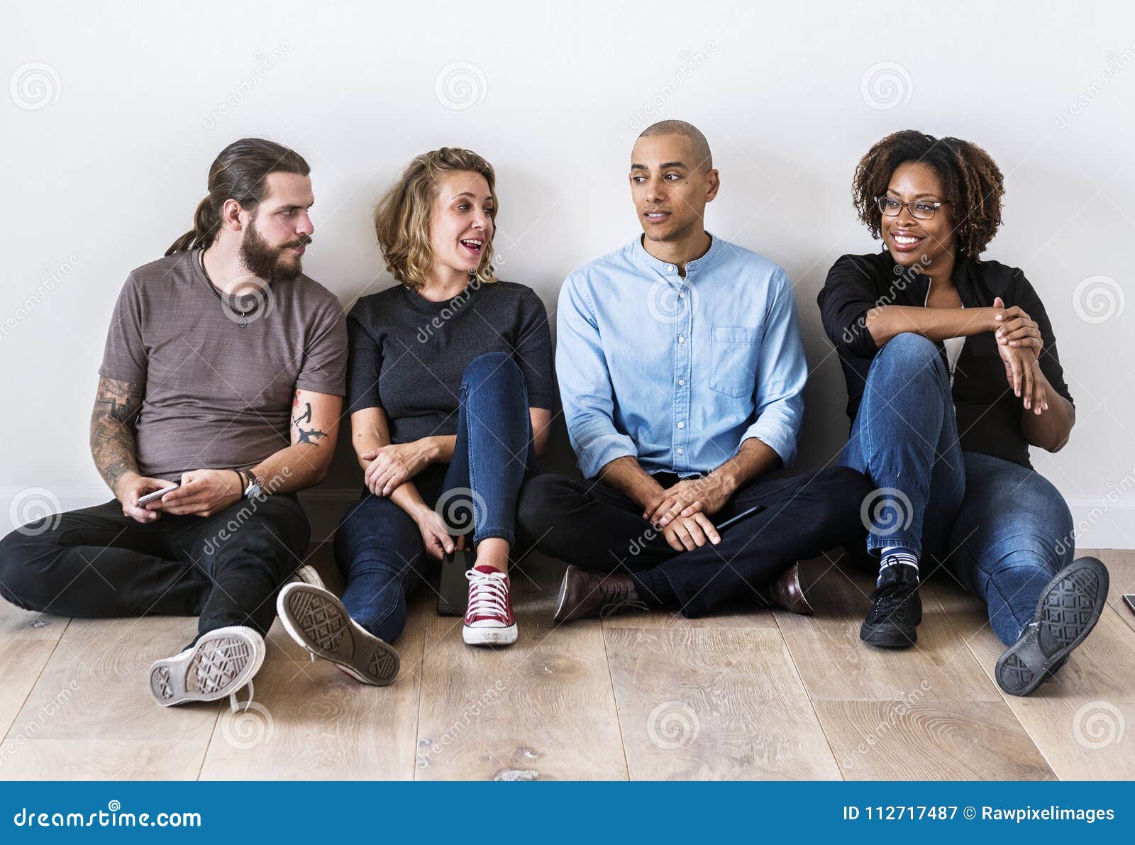 A Group of Diverse Friends Talking Together Stock Image - Image of ...