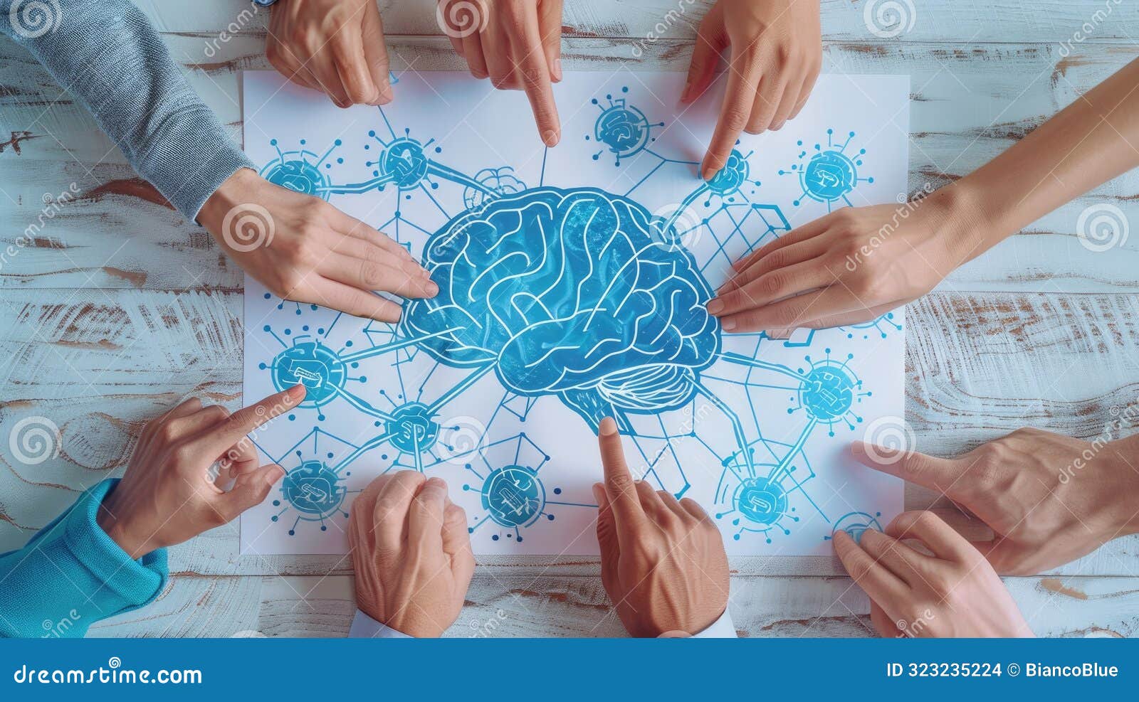 A Group of Diverse Hands Point at a Drawing of a Brain Made of Blue ...