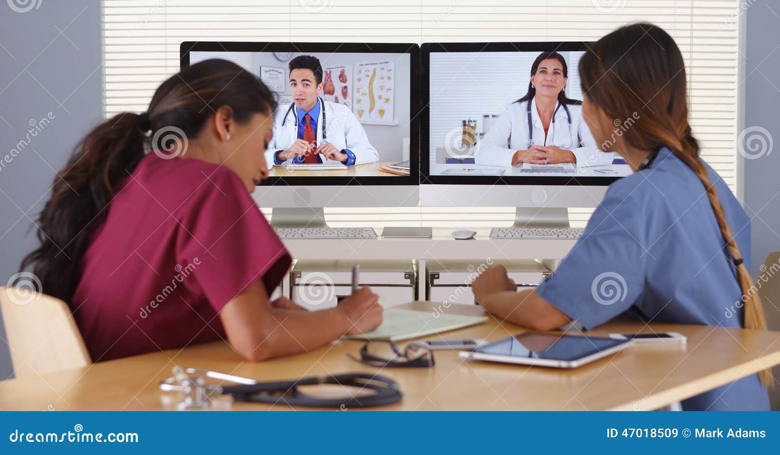 Group of Diverse Medical Doctors Video Conferencing Stock Image - Image ...