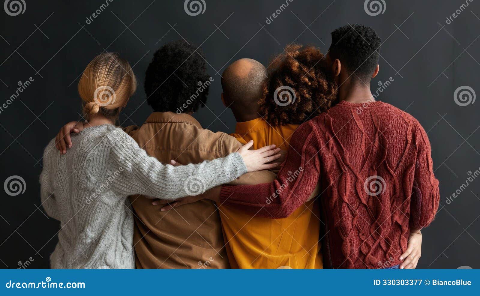 A Group of Diverse People Embracing, Showing Unity and Support AIG535 ...