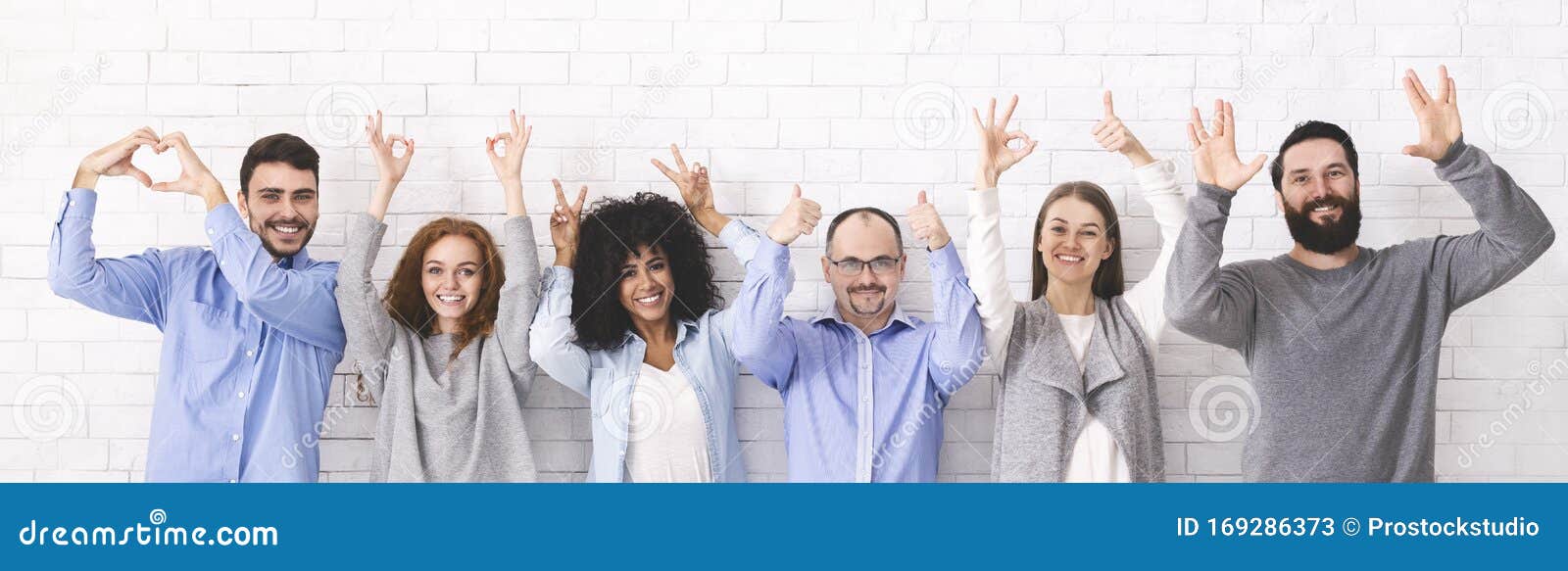 Group of Diverse People Showing Positive Signs at Studio Stock Image ...