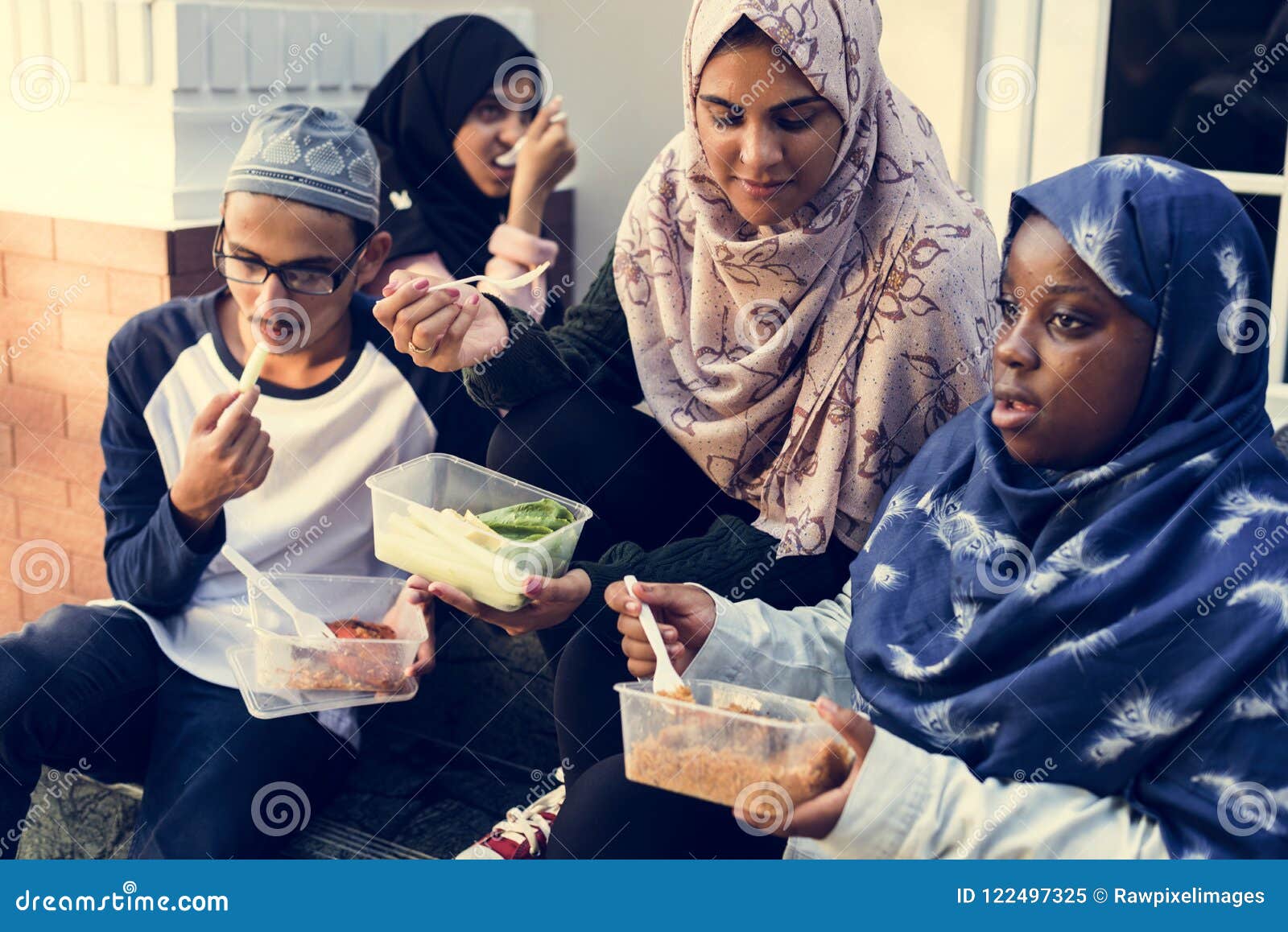 A Group of Diverse Students are Having Lunch Together Stock Image ...