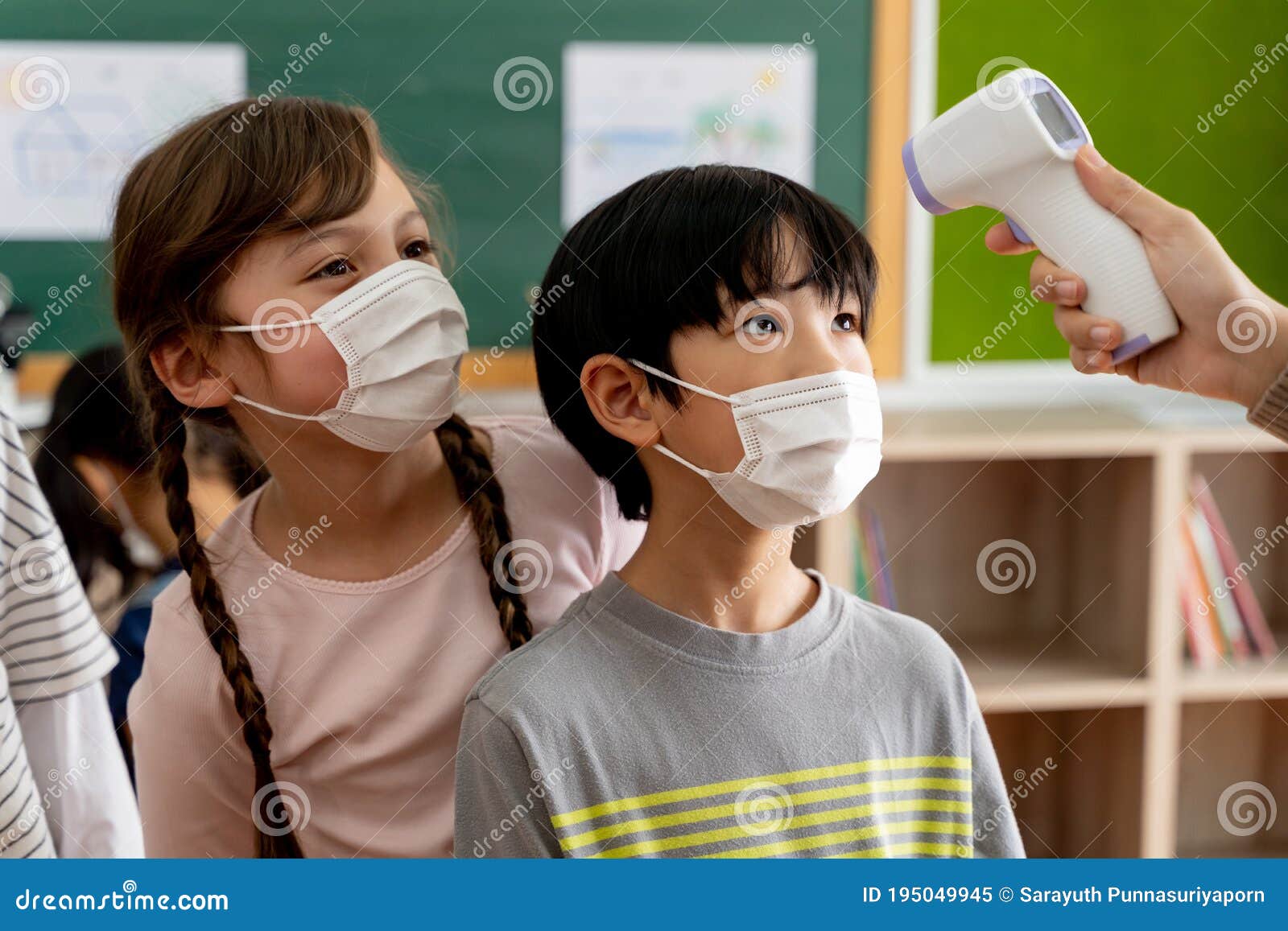 Group of Diverse Students in School Building Checked and Scanned for ...