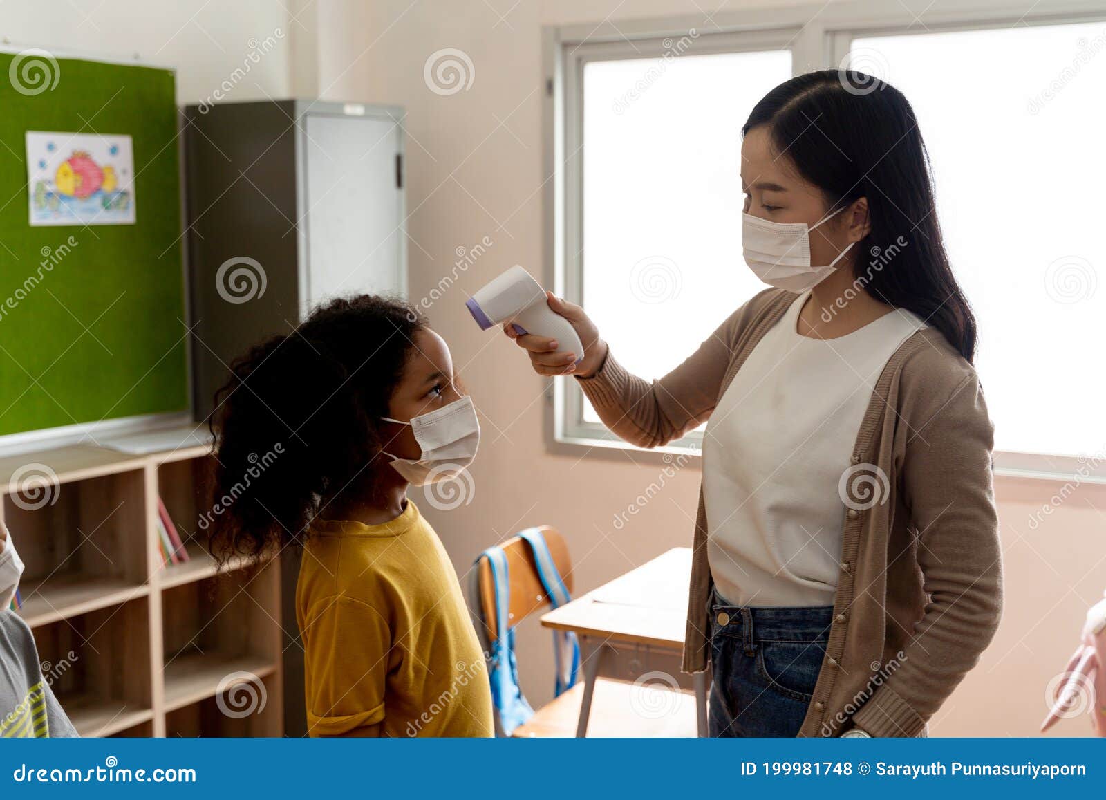Group of Diverse Students in School Building Checked and Scanned for ...