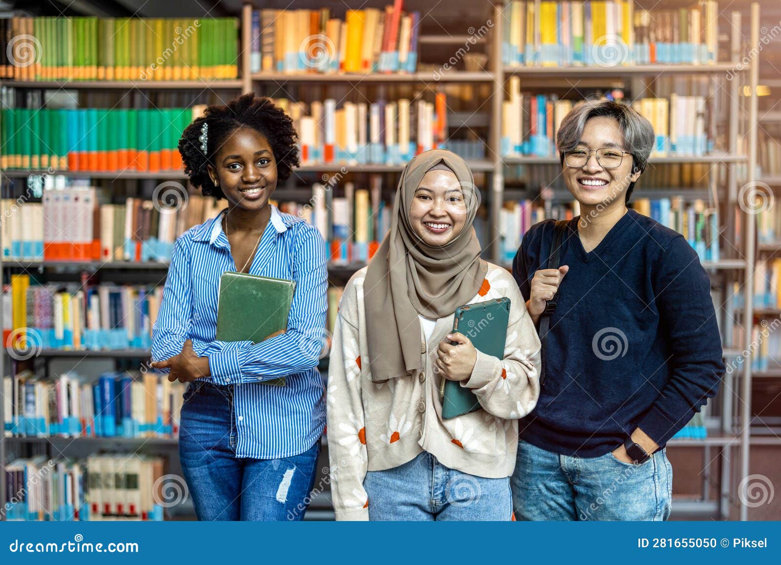 Group of Diverse Students Standing Together in a Library Stock Photo ...