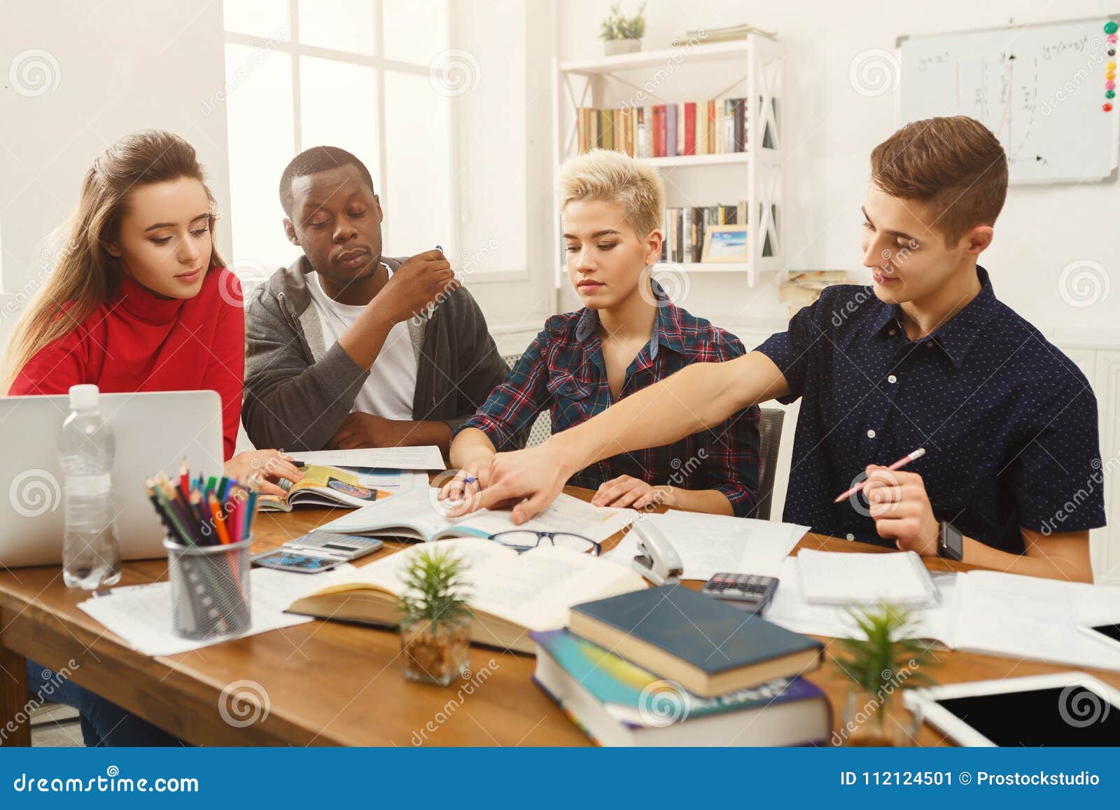 Group of Diverse Students Studying at Wooden Table Stock Image - Image ...