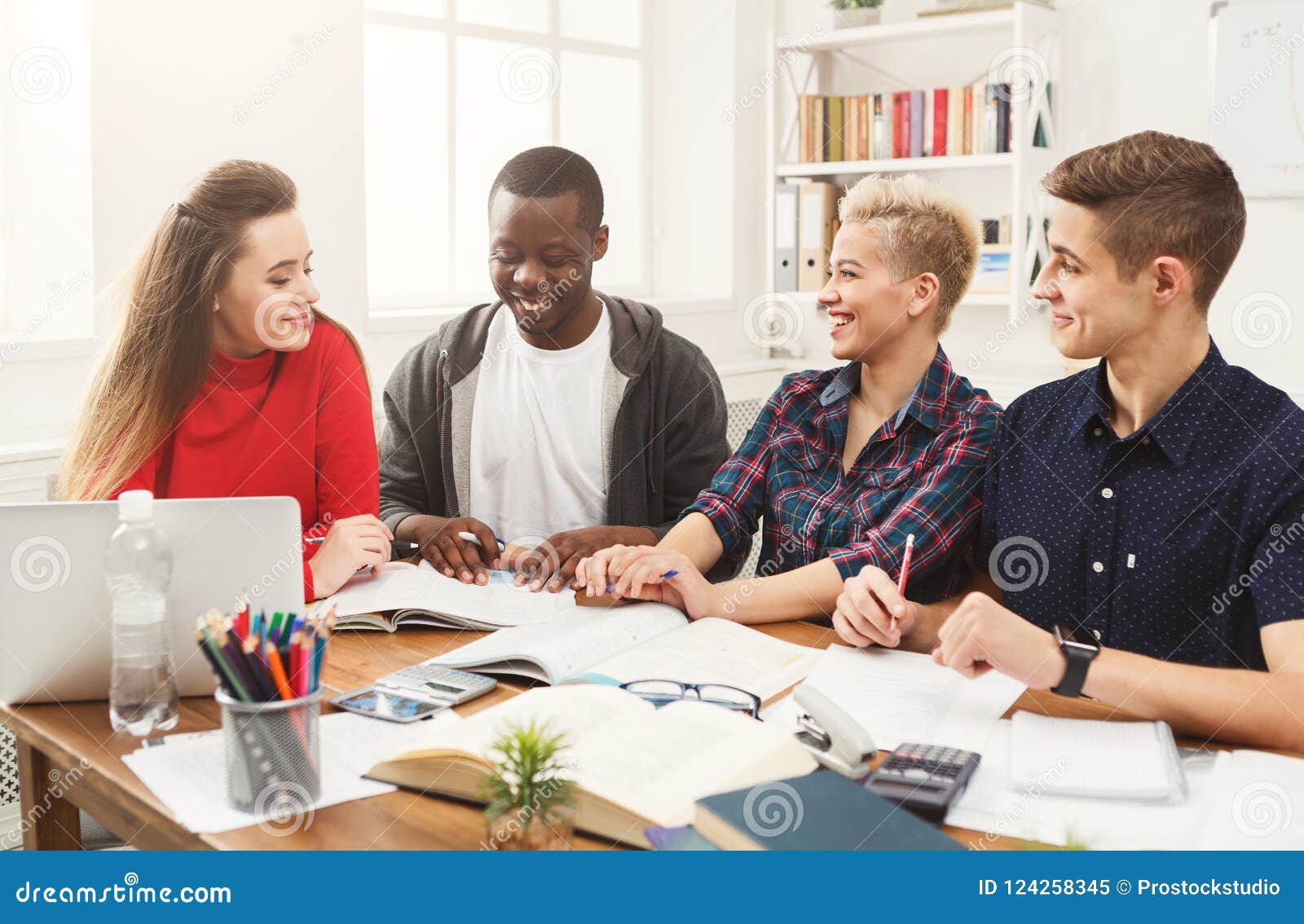 Group of Diverse Students Studying at Wooden Table Stock Image - Image ...
