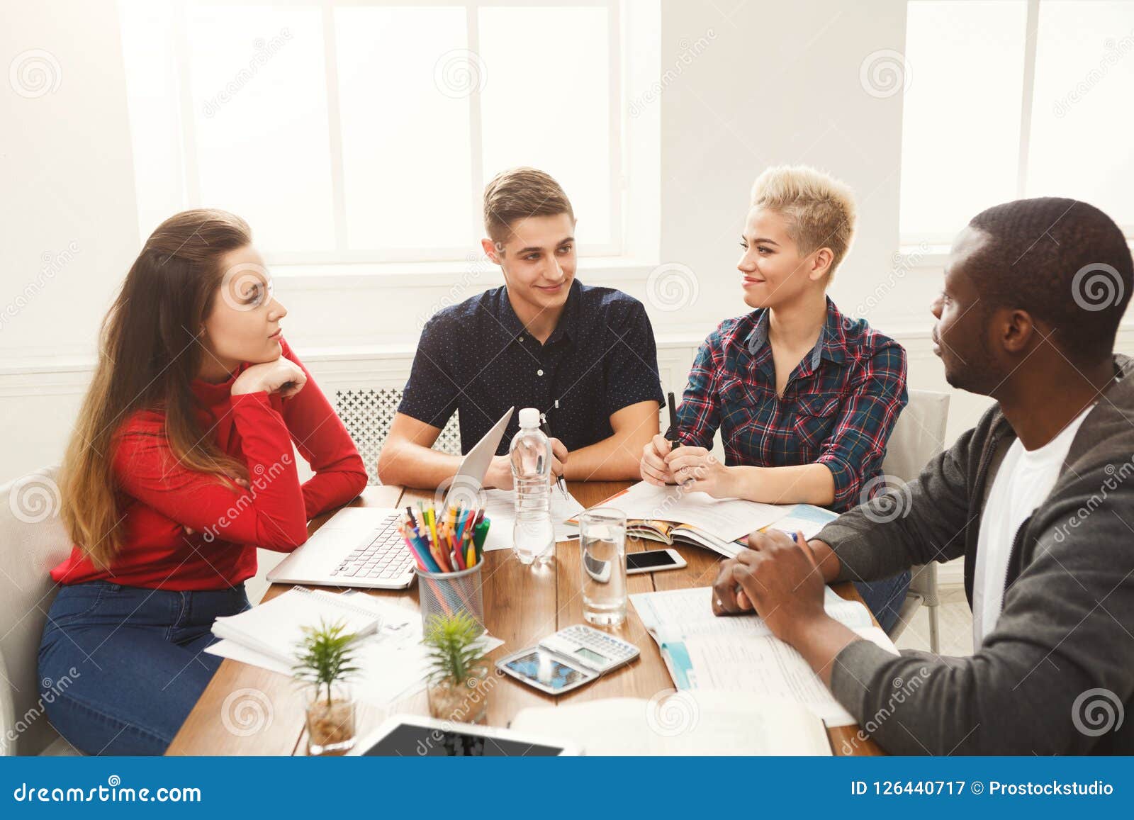 Group of Diverse Students Studying at Wooden Table Stock Image - Image ...